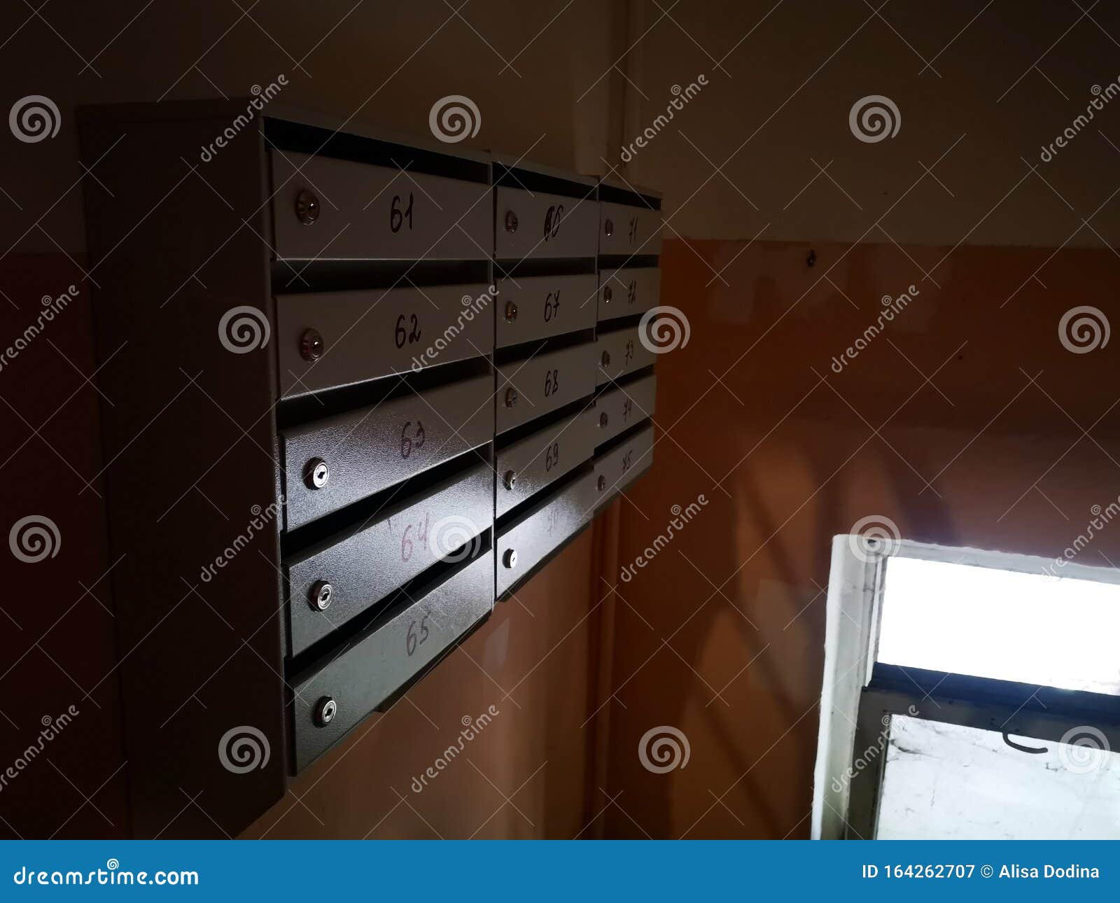 Gray mailboxes on the wall stock image. Image of letterbox - 164262707