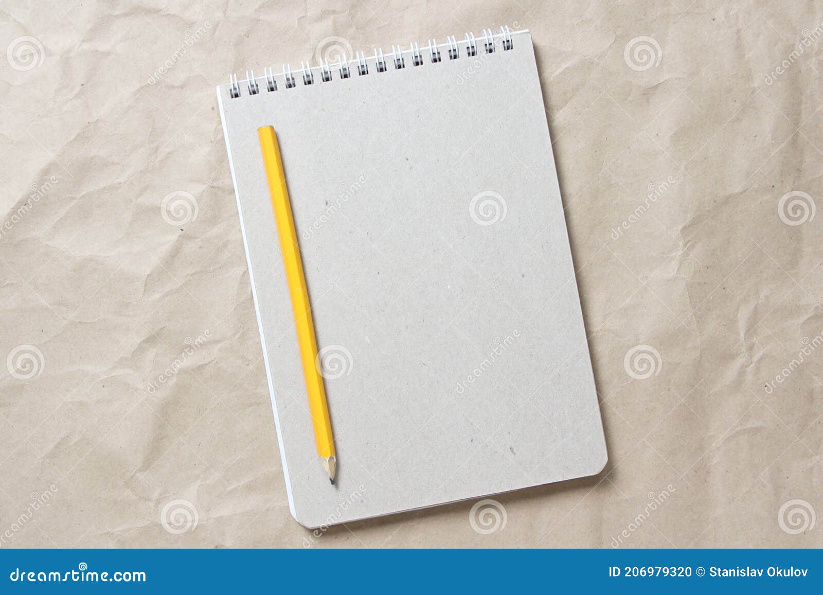 Gray Notepad with White Coiled Spring and Pencil on a Background of ...