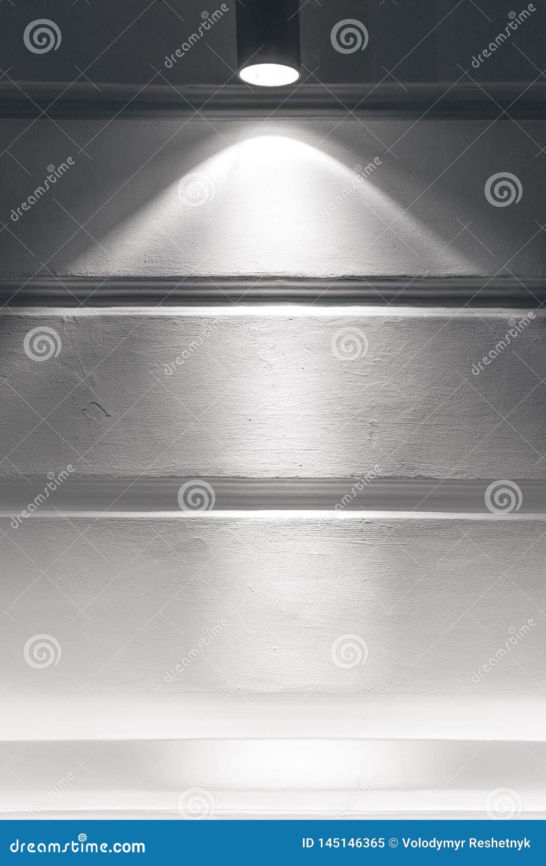 Gray Plastered Wall with a Beam of Light from the Spotlight. Stock ...