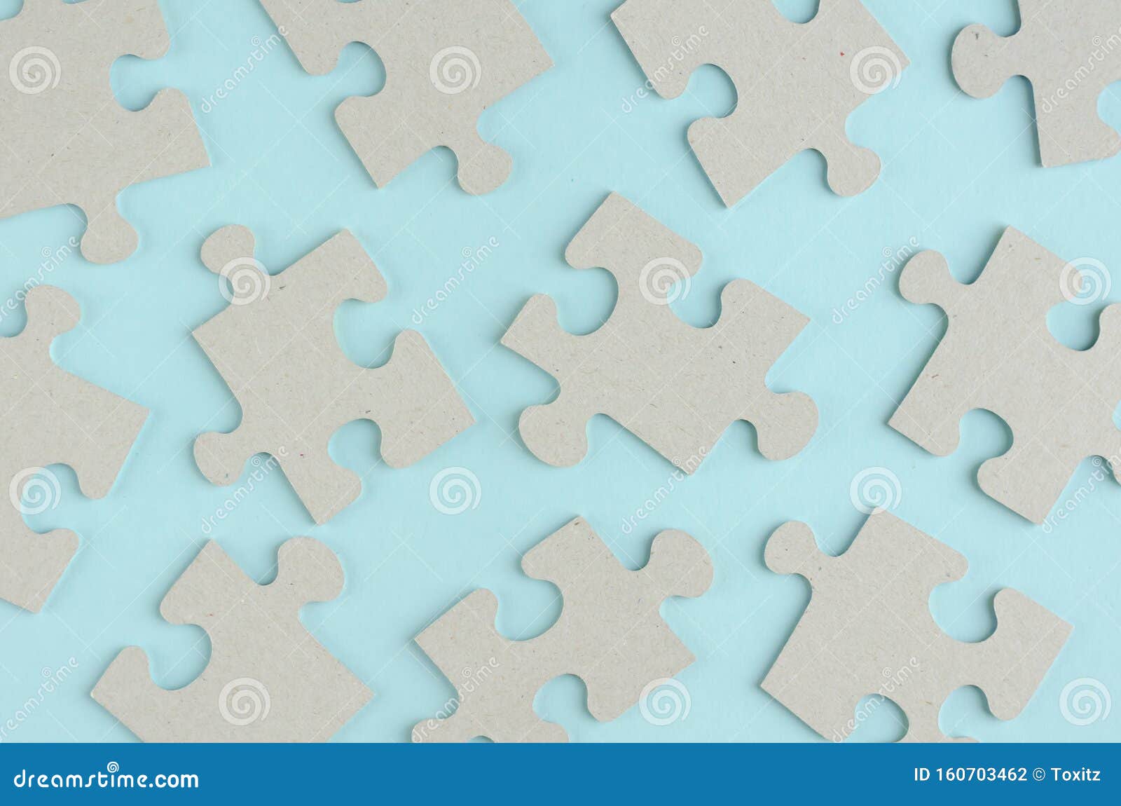 Gray Puzzles Composition on Blue Background. Flat Lay Stock Photo ...
