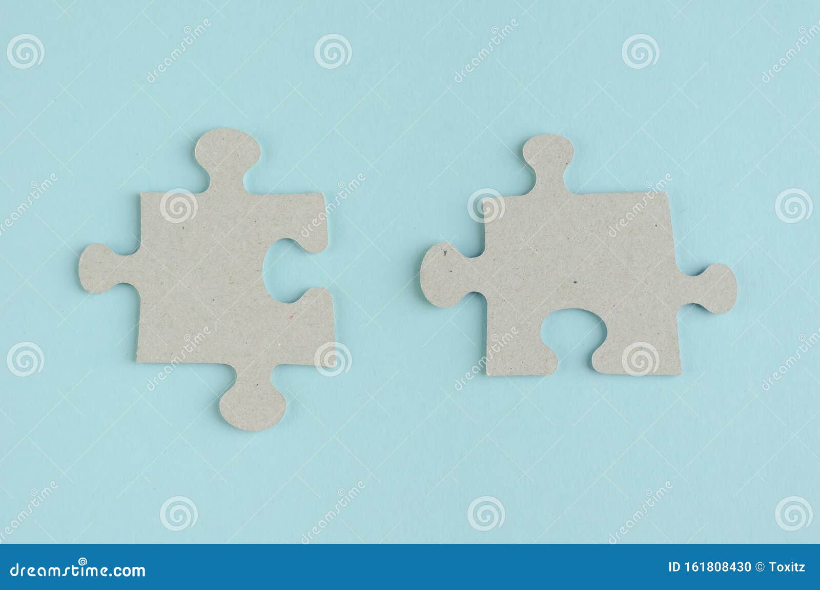 Gray Puzzles Composition on Blue Background. Flat Lay Stock Photo ...