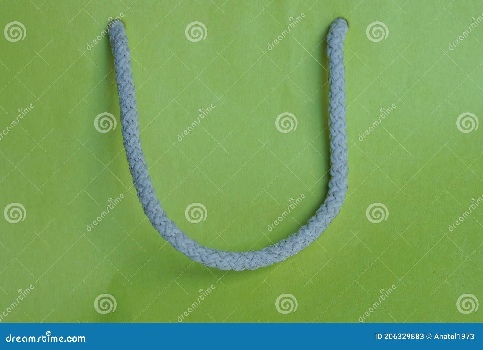 Gray Rope Harness on Green Paper Bag Stock Image - Image of retail ...