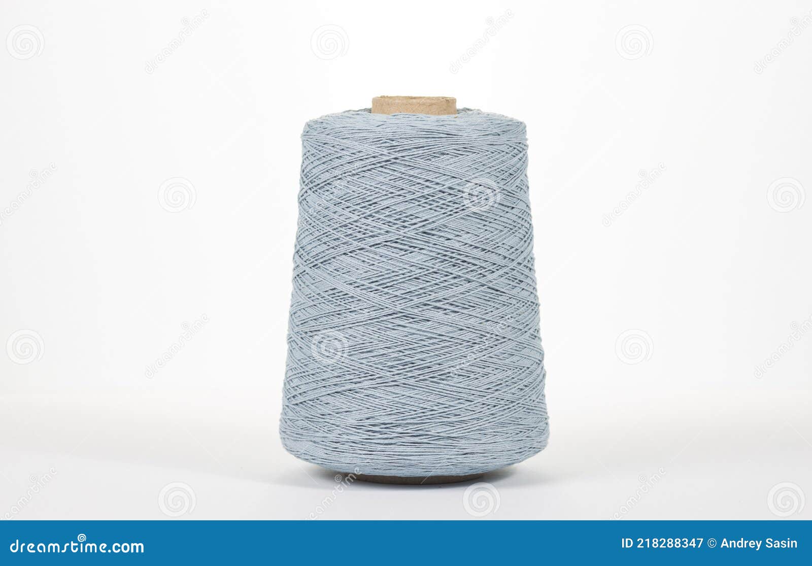 Gray Spool of Yarn on a White Background. Side View. Textile Spool on ...