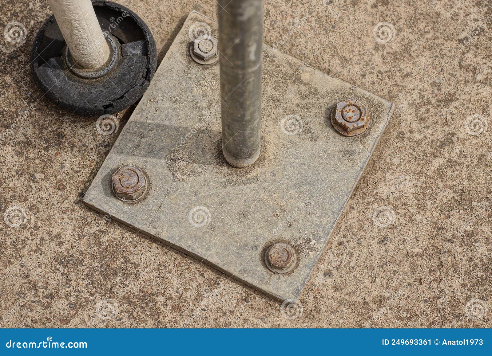 Gray Square Iron Plate with Pipe Bolted into Concrete Floor Stock Image ...