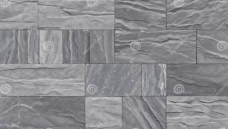 Gray Stone Wall Cladding with Varying Tile Sizes and Textures Creates a ...