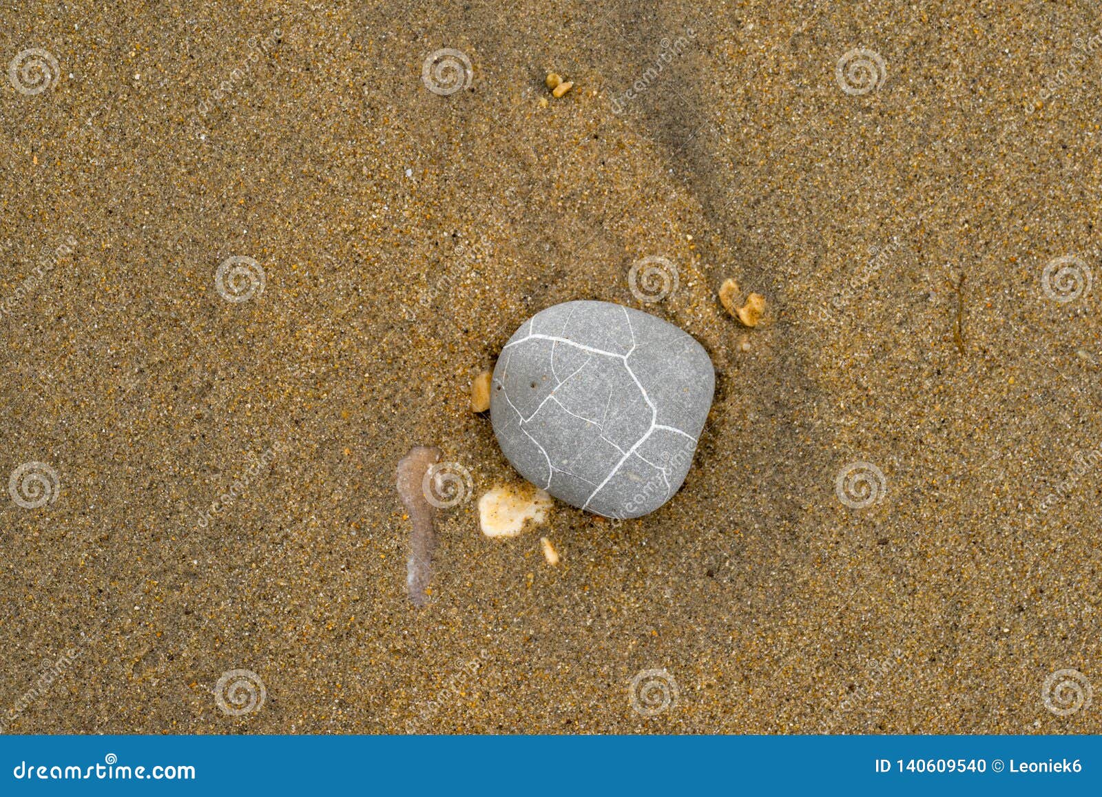 Gray Stone with White Lines Lying on a Sand Beach. Stock Photo - Image ...