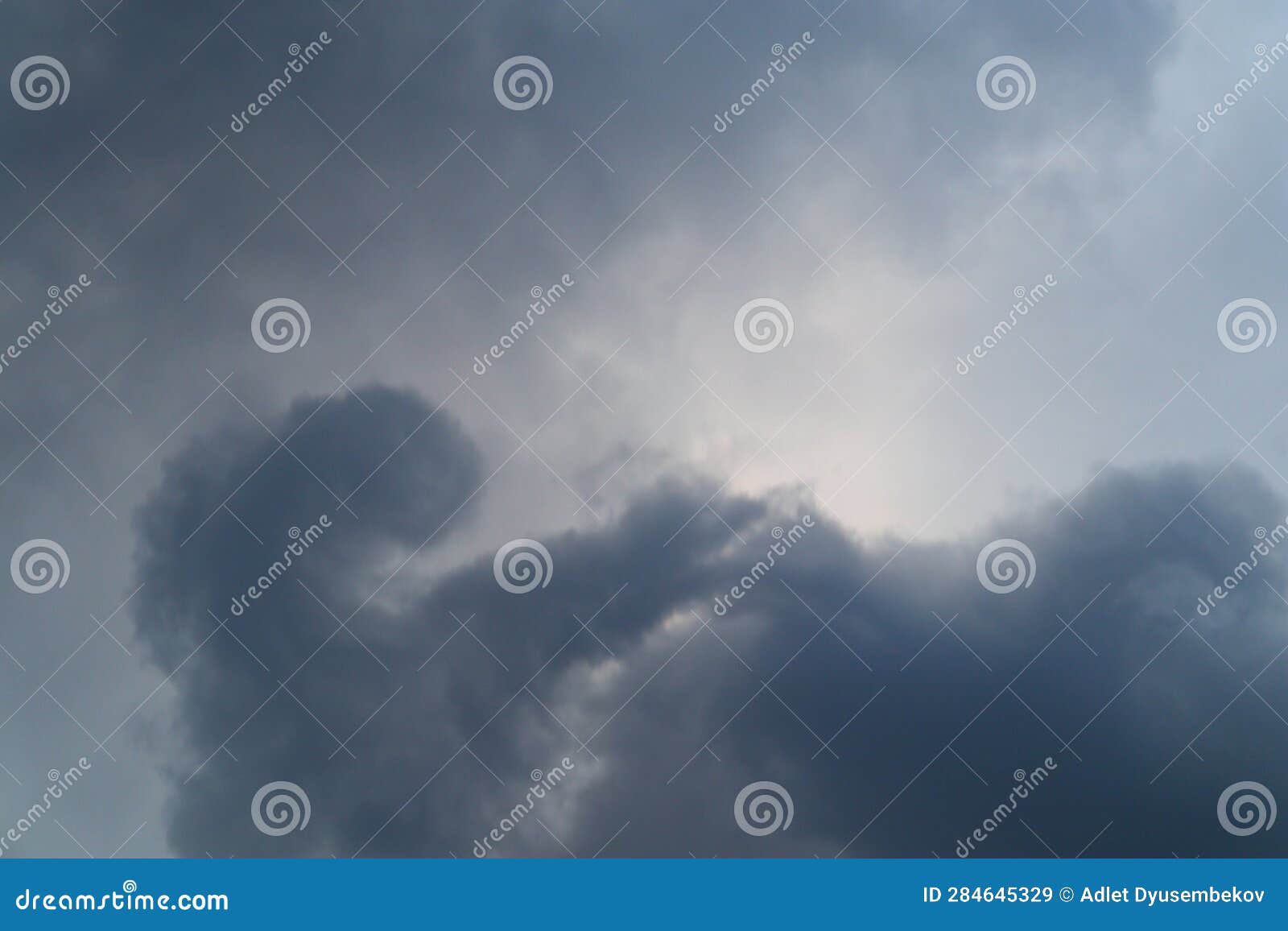 Gray Storm Clouds of Various Shapes Float Across the Sky. Stock Image ...