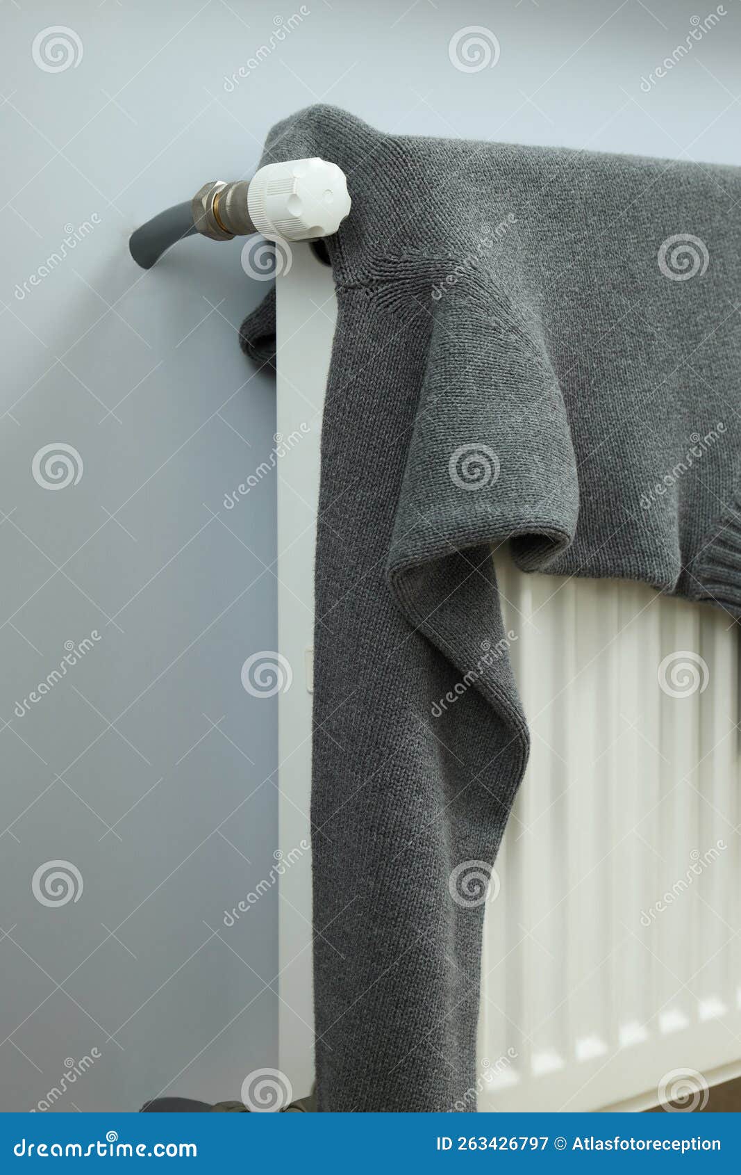 Gray Sweater Drying on a Radiator Indoor Stock Image - Image of heater ...