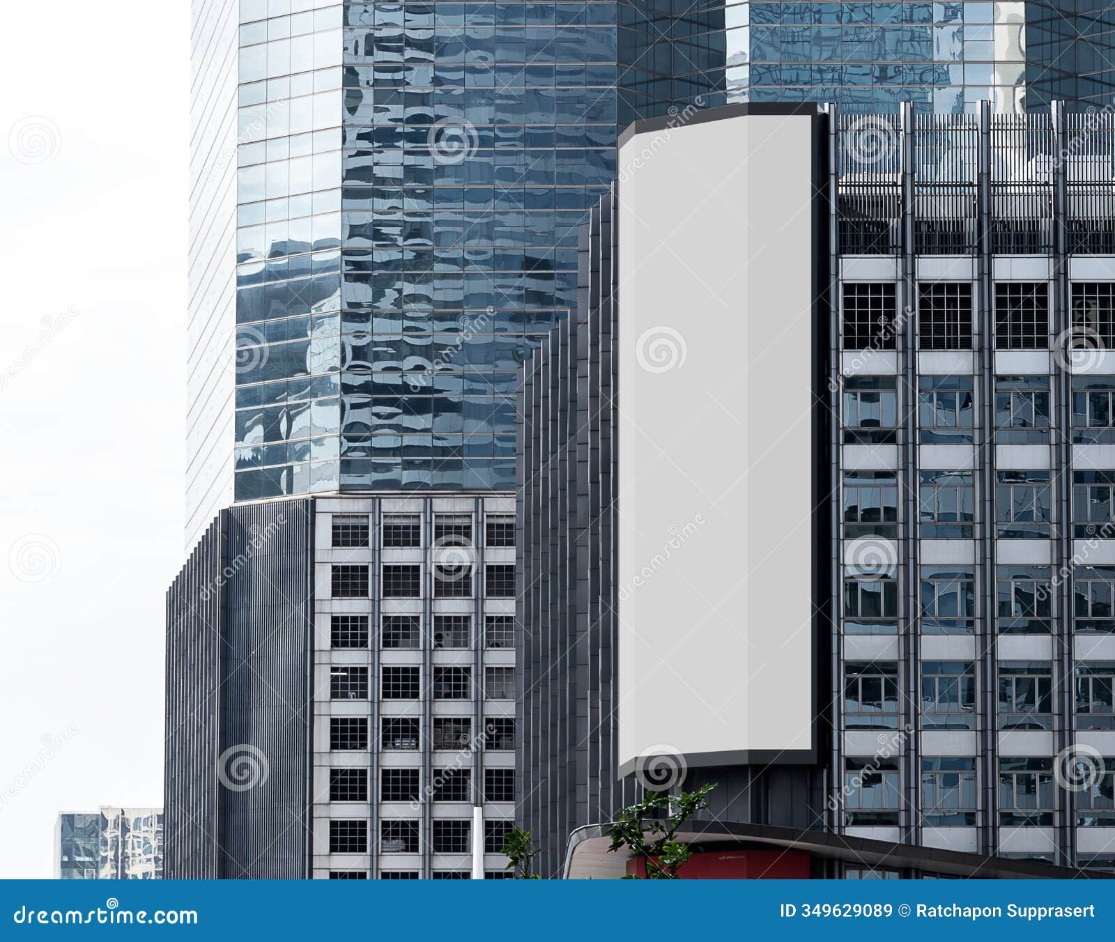 Gray Vertical Large LED Display Billboard on Building with Cityscape ...