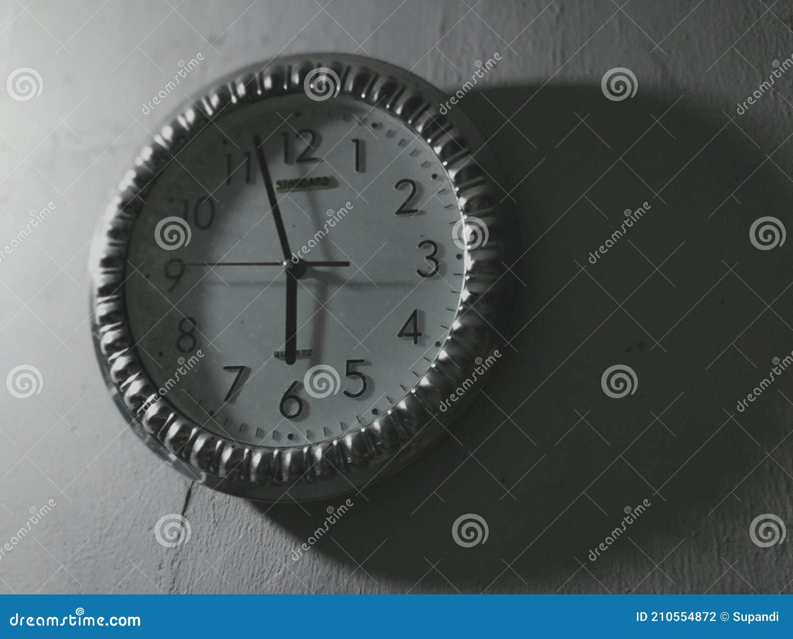 Gray wall clock shadow editorial photography. Image of gray - 210554872