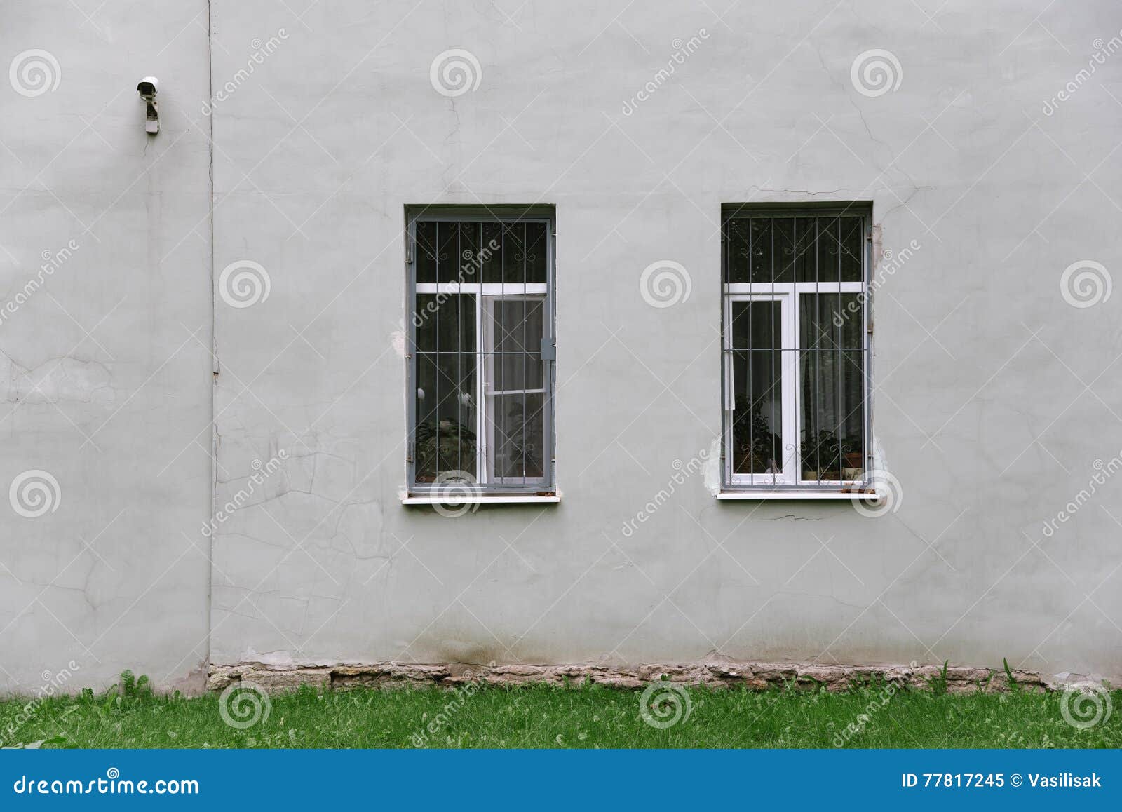 Gray wall with two windows stock image. Image of pattern - 77817245