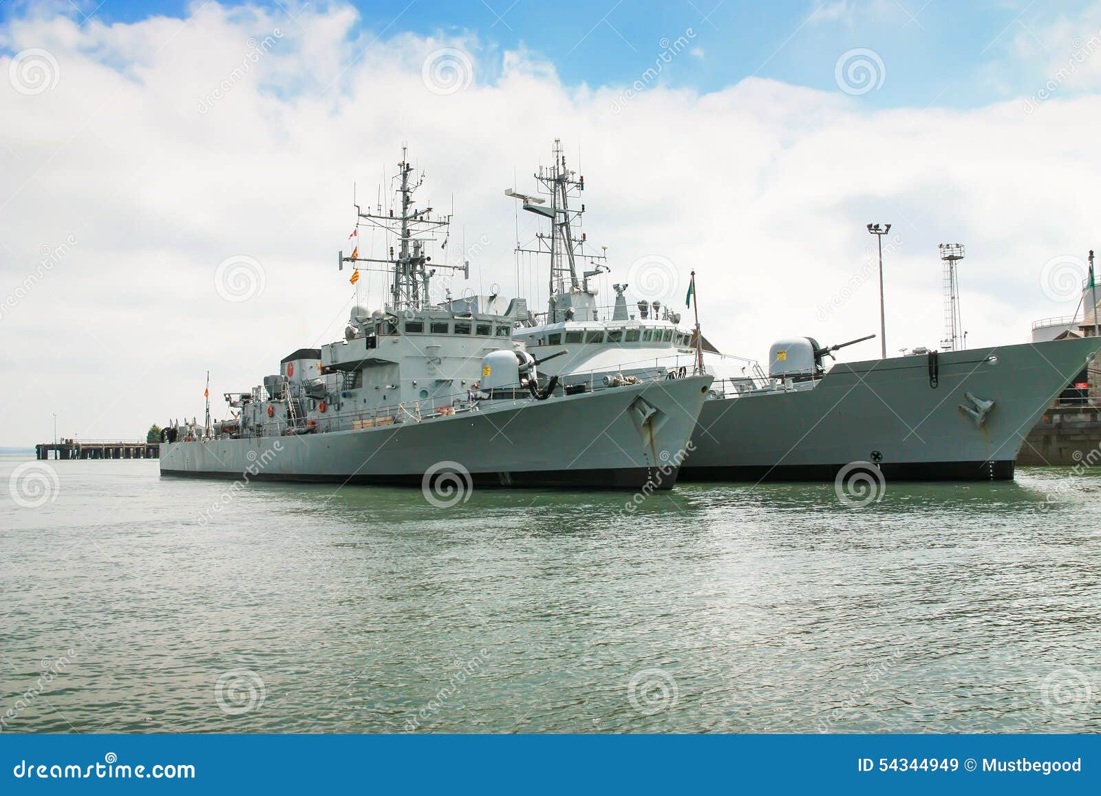 Gray War Ships on the Background of Bright Cloudy Sky Stock Image ...