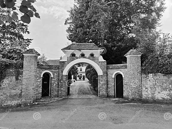 Grayscale of an Arched Gate To the Park Stock Photo - Image of ...