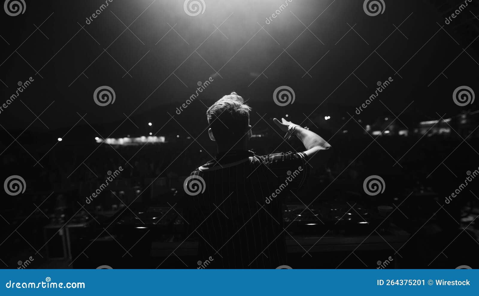 Grayscale Back View of a Male DJ on a Stage Stock Image - Image of ...