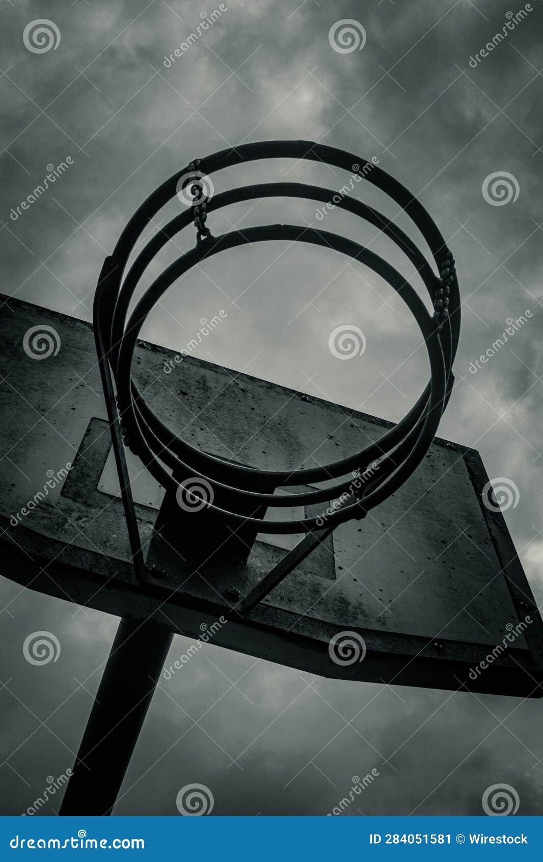 Grayscale of a Basketball Hoop on an Empty Playground Stock Image ...