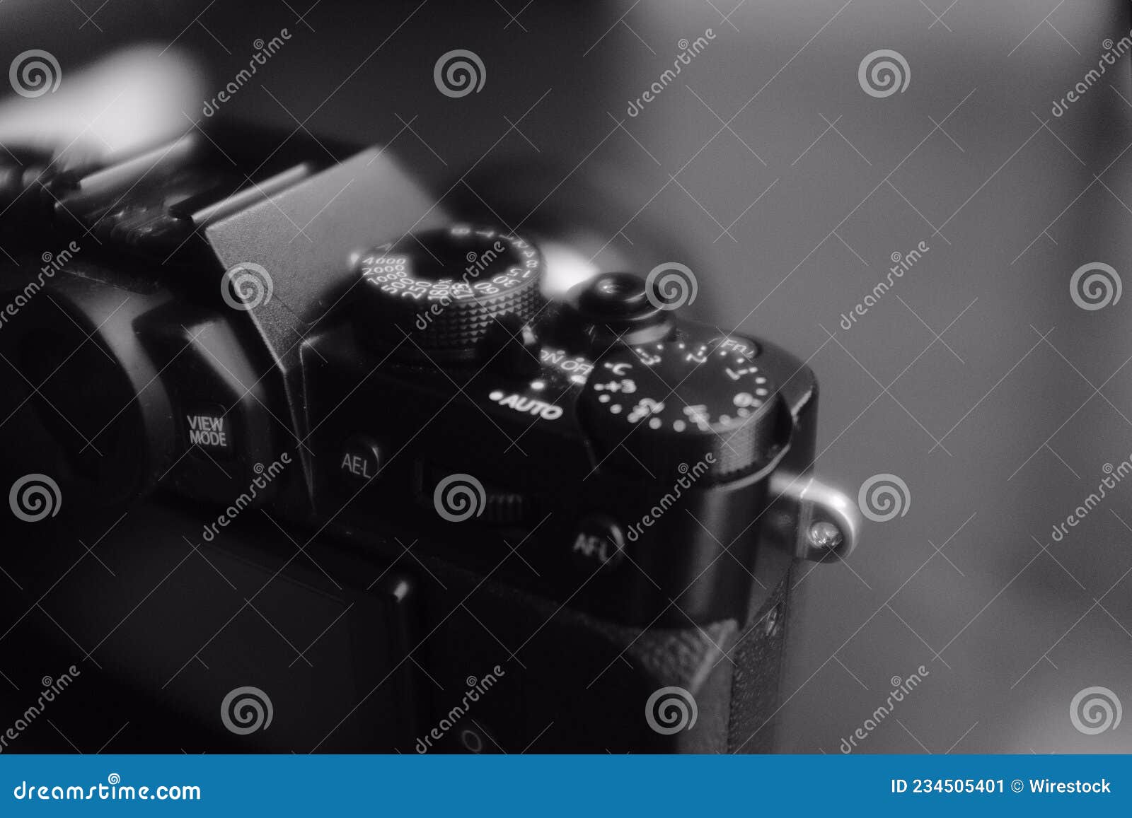 Grayscale Closeup Shot of a Camera on Blurred Background Stock Image ...