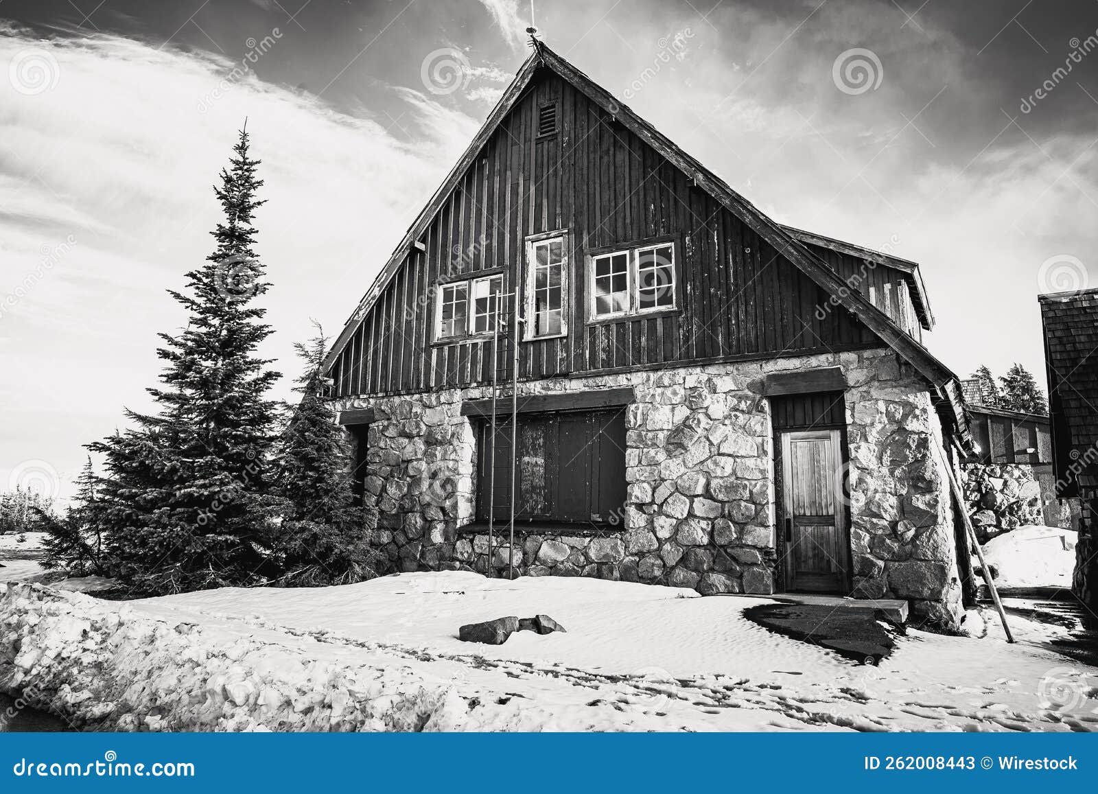 Grayscale of a Mountain Lodge Cabin Under a Bright Sunny Sky Stock ...