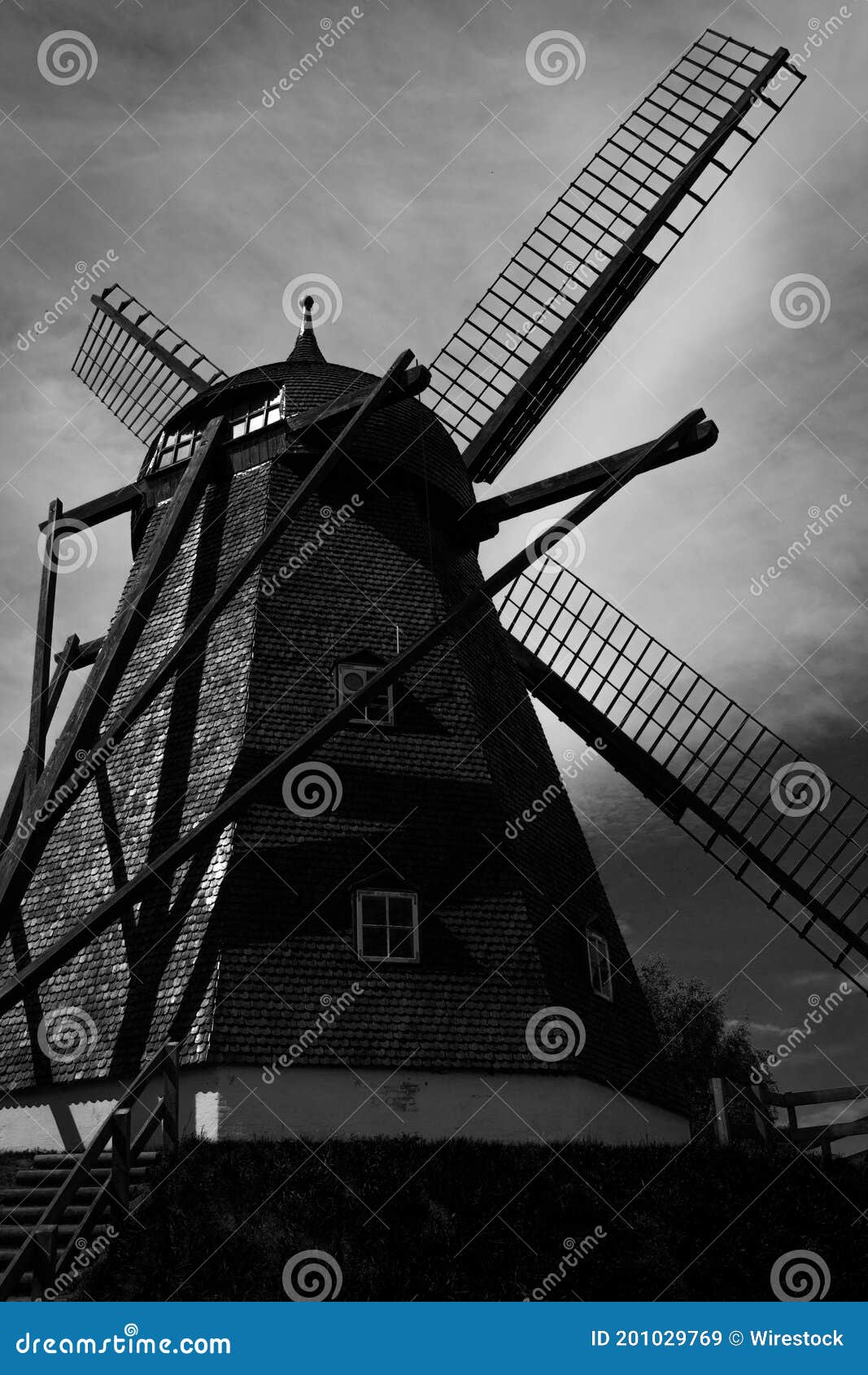 Grayscale of an Old Windmill Under a Cloudy Sky at Daylight Stock Image ...