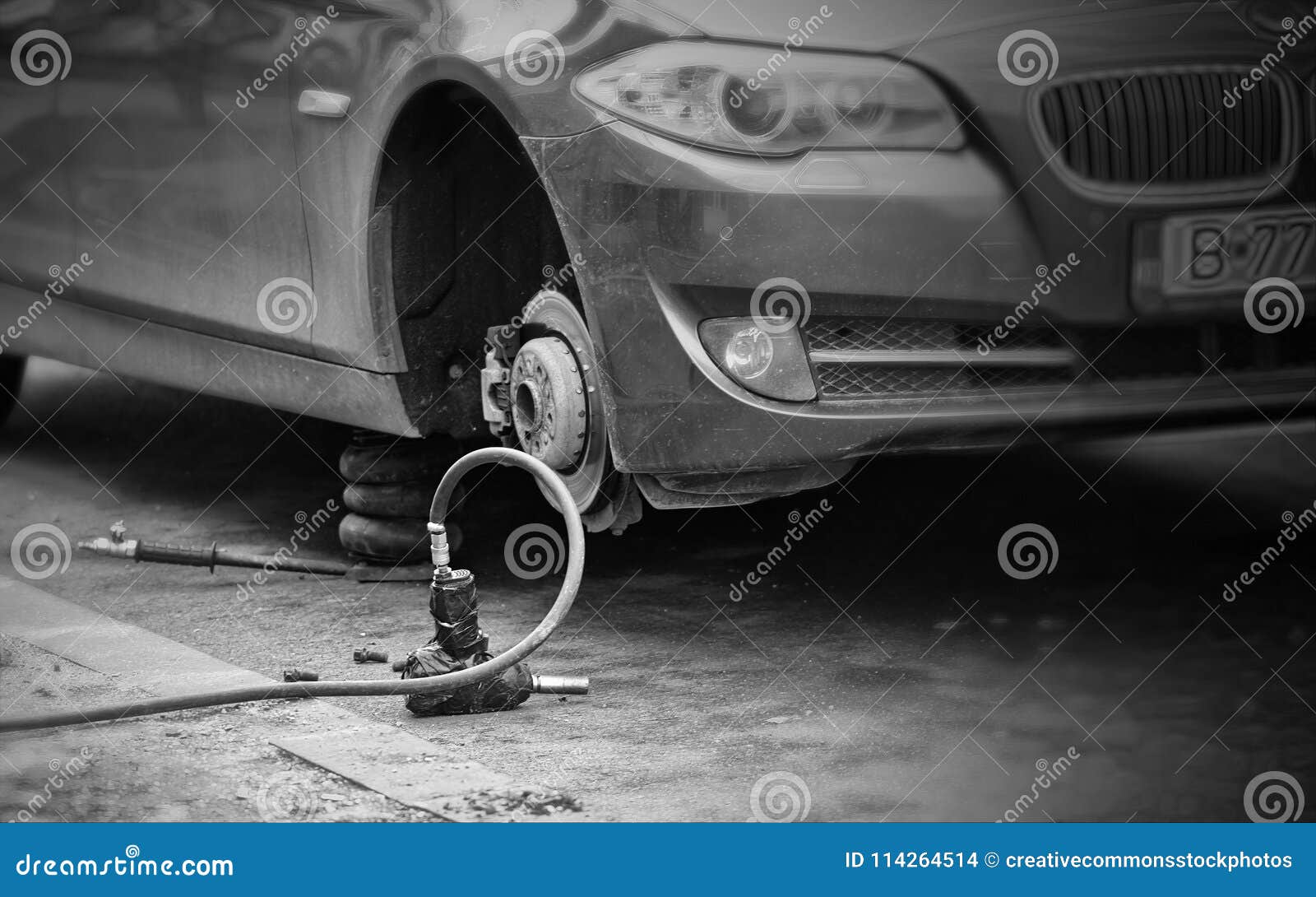 Grayscale Photo Of Car Without Wheel Picture. Image: 114264514