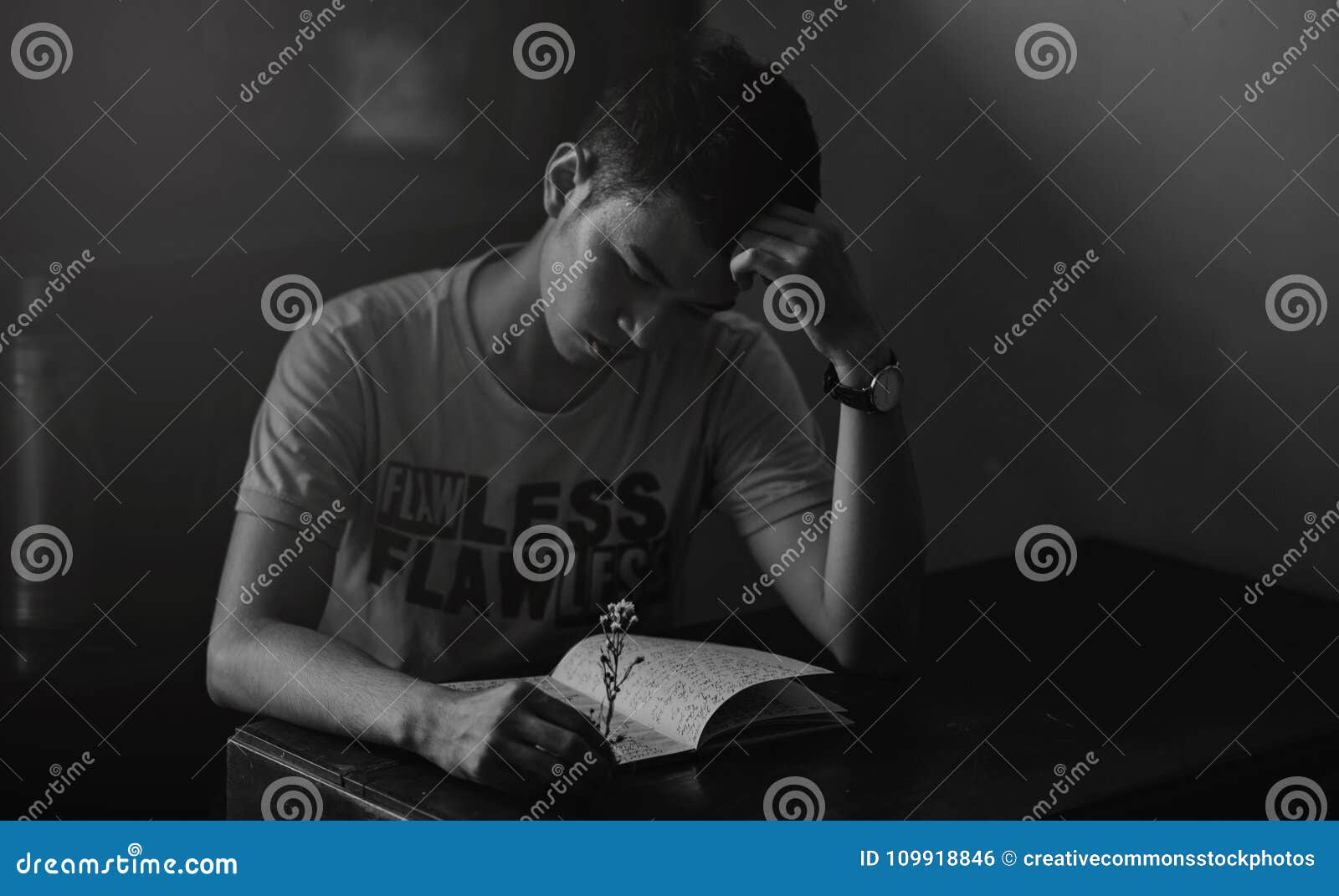 Grayscale Photography Of Man In Shirt Reading Notebook Picture. Image ...
