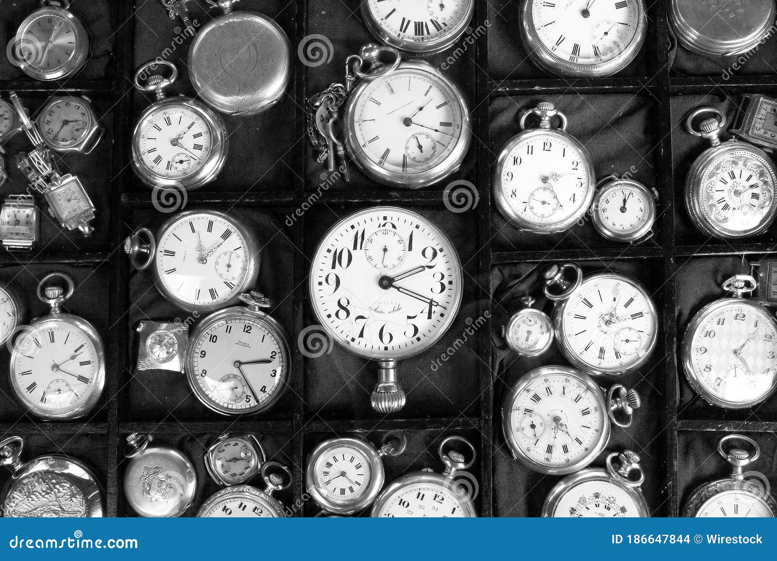 Grayscale Selective Focus Shot of Clocks on the Shelves Editorial Stock ...