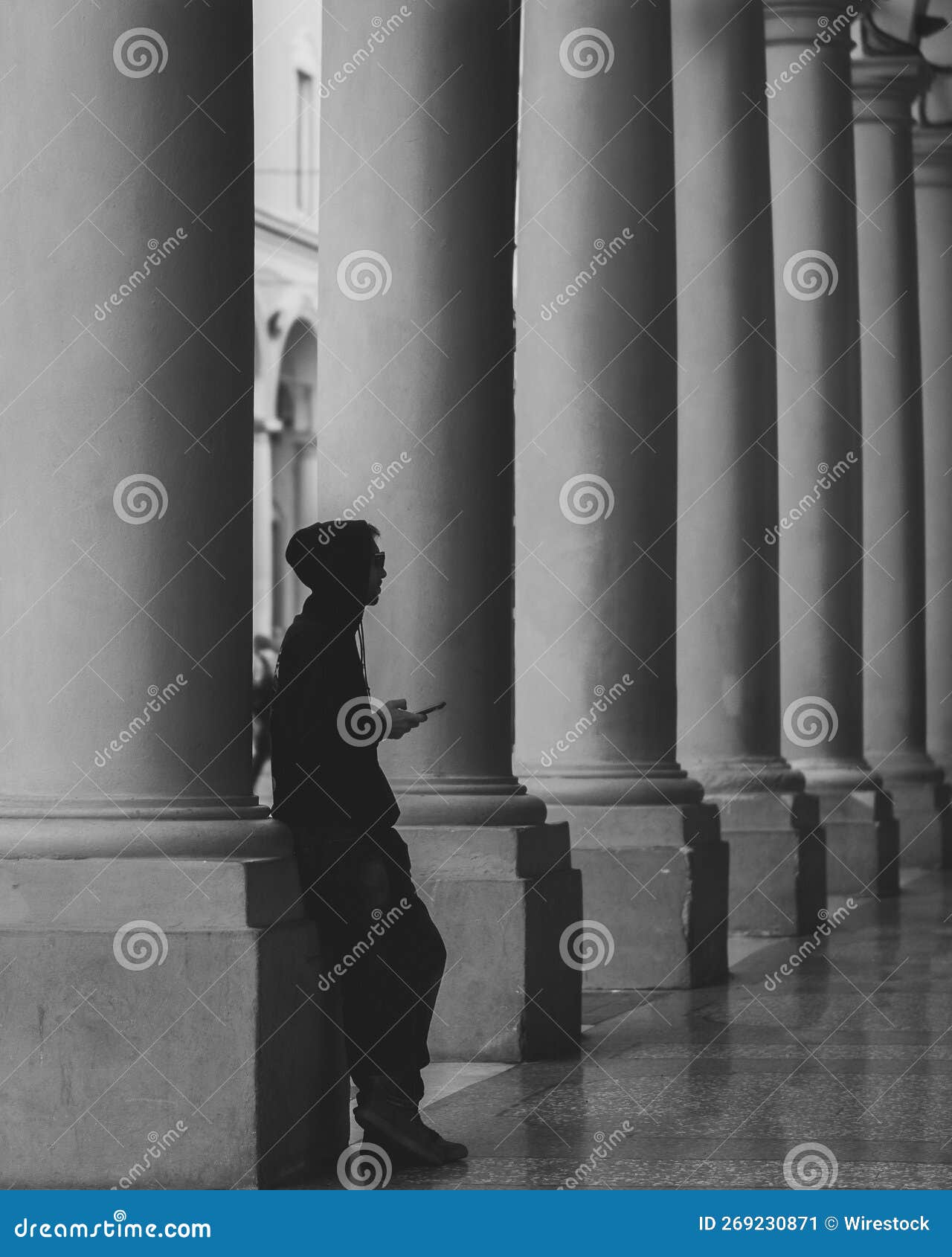 Grayscale of Shadow Figure of a Guy Leaning on a Column Editorial Photo ...