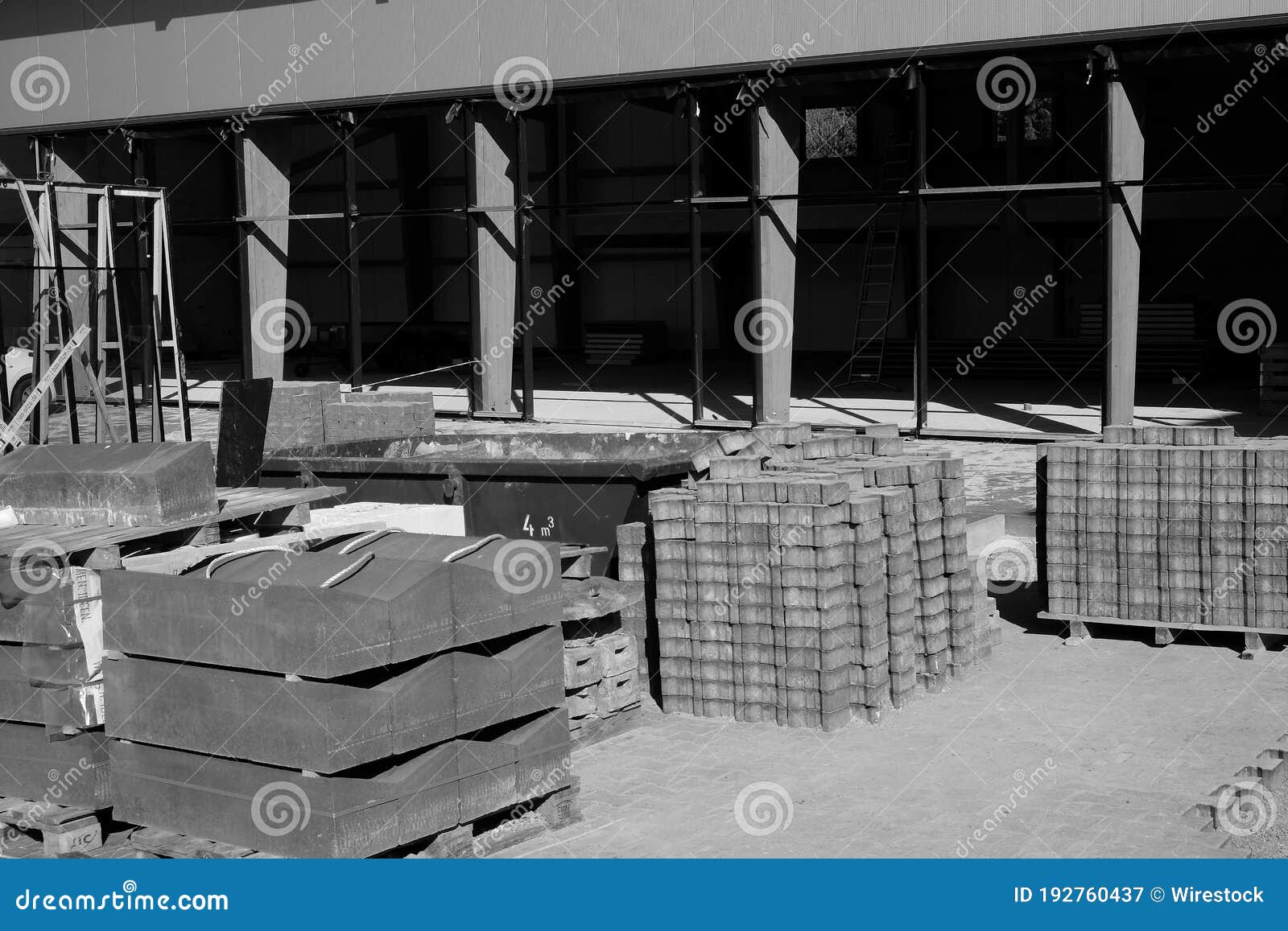Grayscale Shot of Bricks in Front of a Building Being Build Stock Image ...