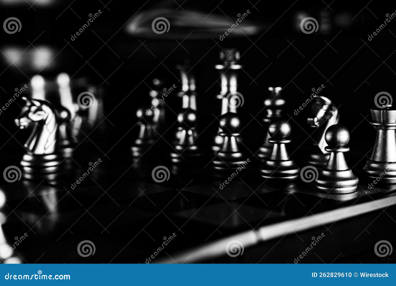 Grayscale Shot of a Chess Board with the Pieces Lined on Top Stock ...