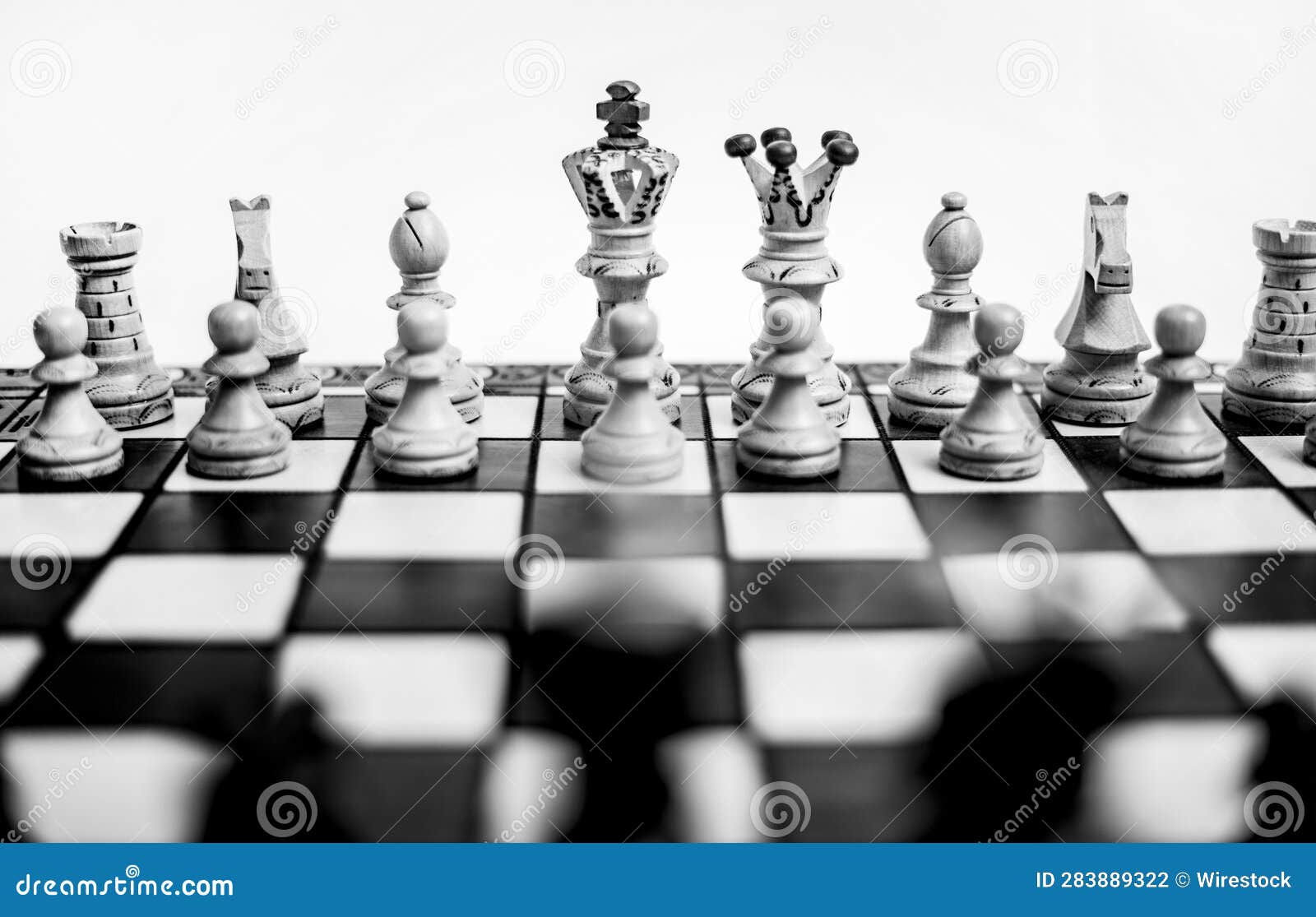 Grayscale Shot of a Chessboard with a Full Set of Chess Pieces Arranged ...