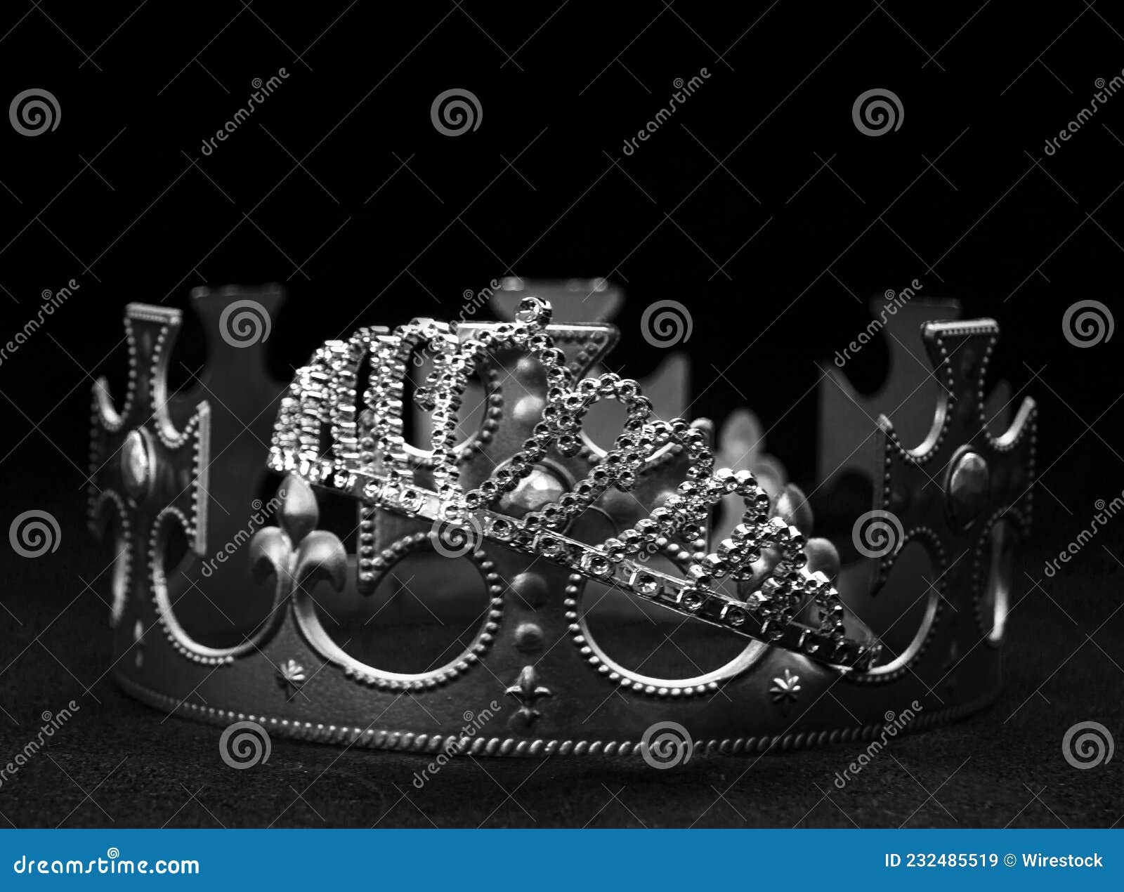 Grayscale Shot of a Crown and a Tiara on a Dark Background Stock Image ...