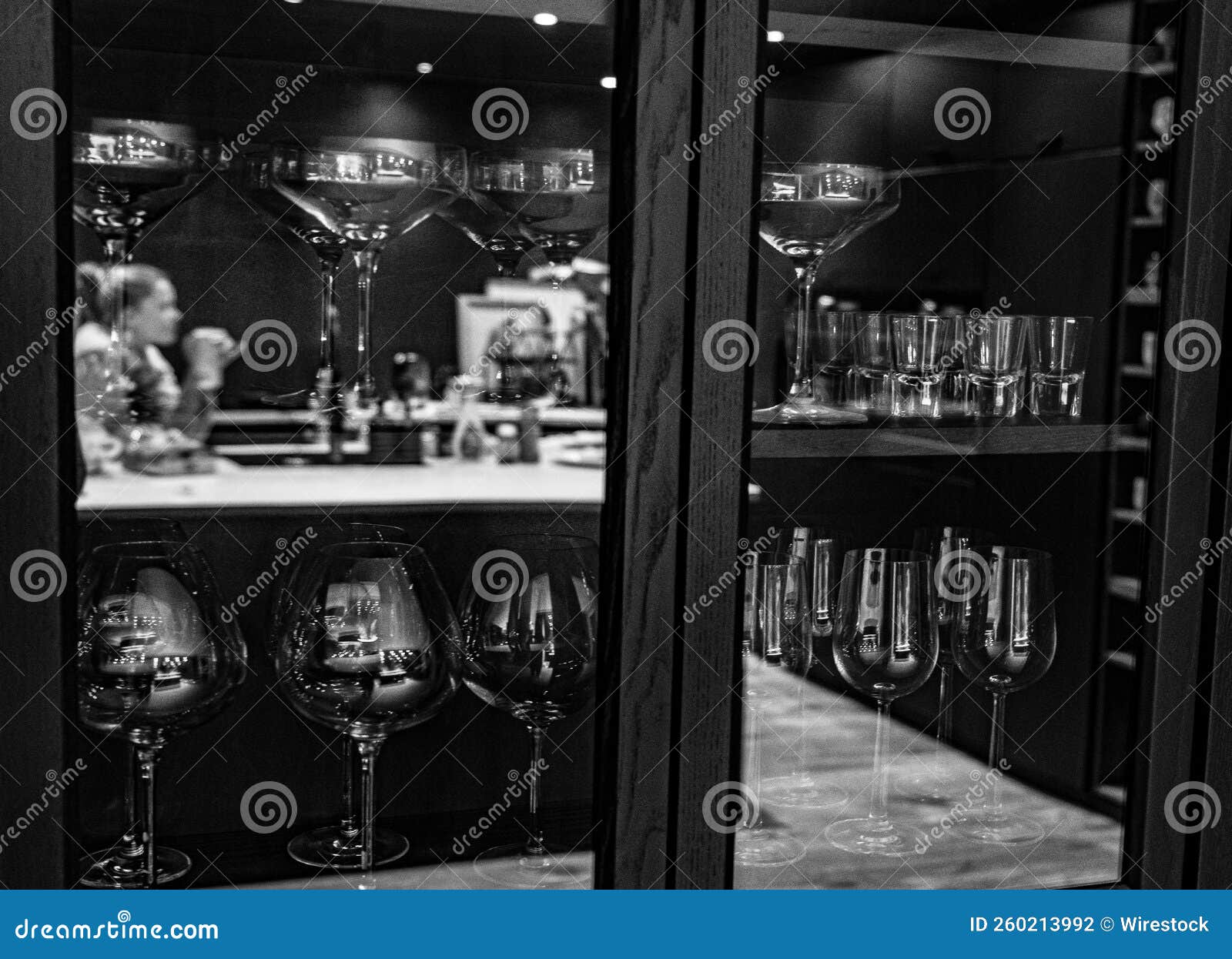 Grayscale Shot of Different Glasses in the Cafe Stock Photo - Image of ...