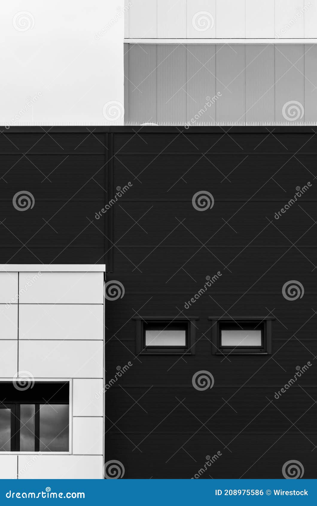 Grayscale Shot of a Facade of a Building Stock Photo - Image of window ...