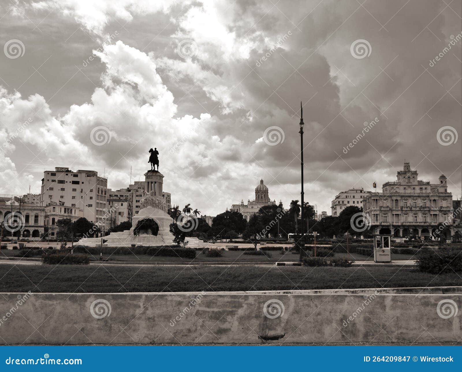 Grayscale Shot of Maximo Gomez Monument Against the Cloudy Sky ...