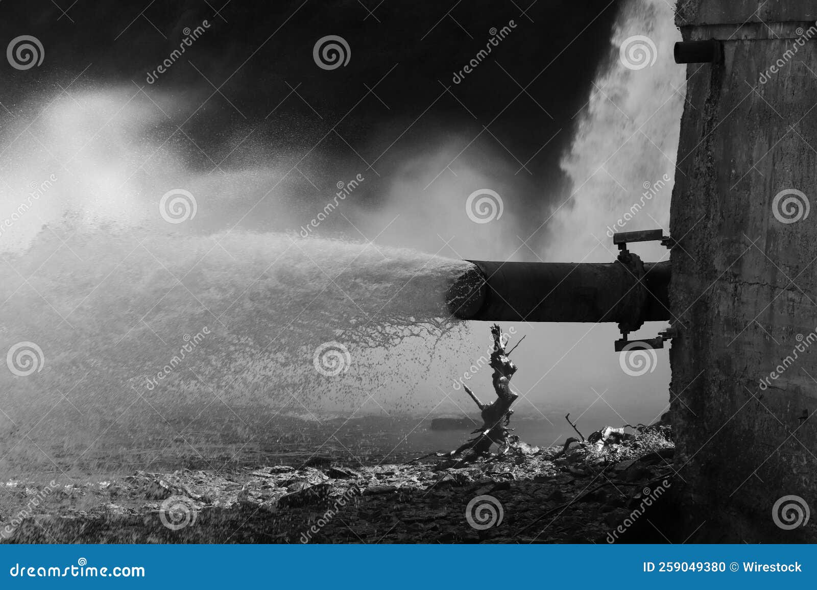 Grayscale Shot of a Pump Splashing and Functioning Water To the Sea ...
