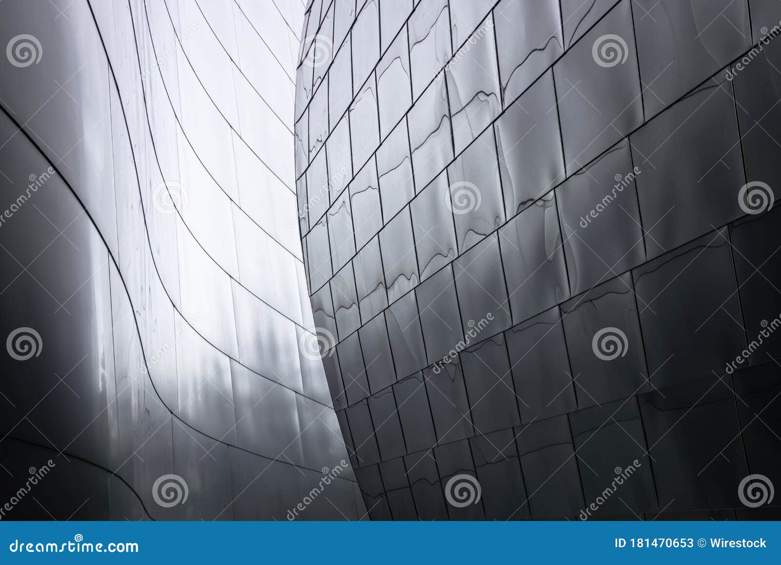 Grayscale Shot of a Reflective Glass of a Modern Architectural Building ...