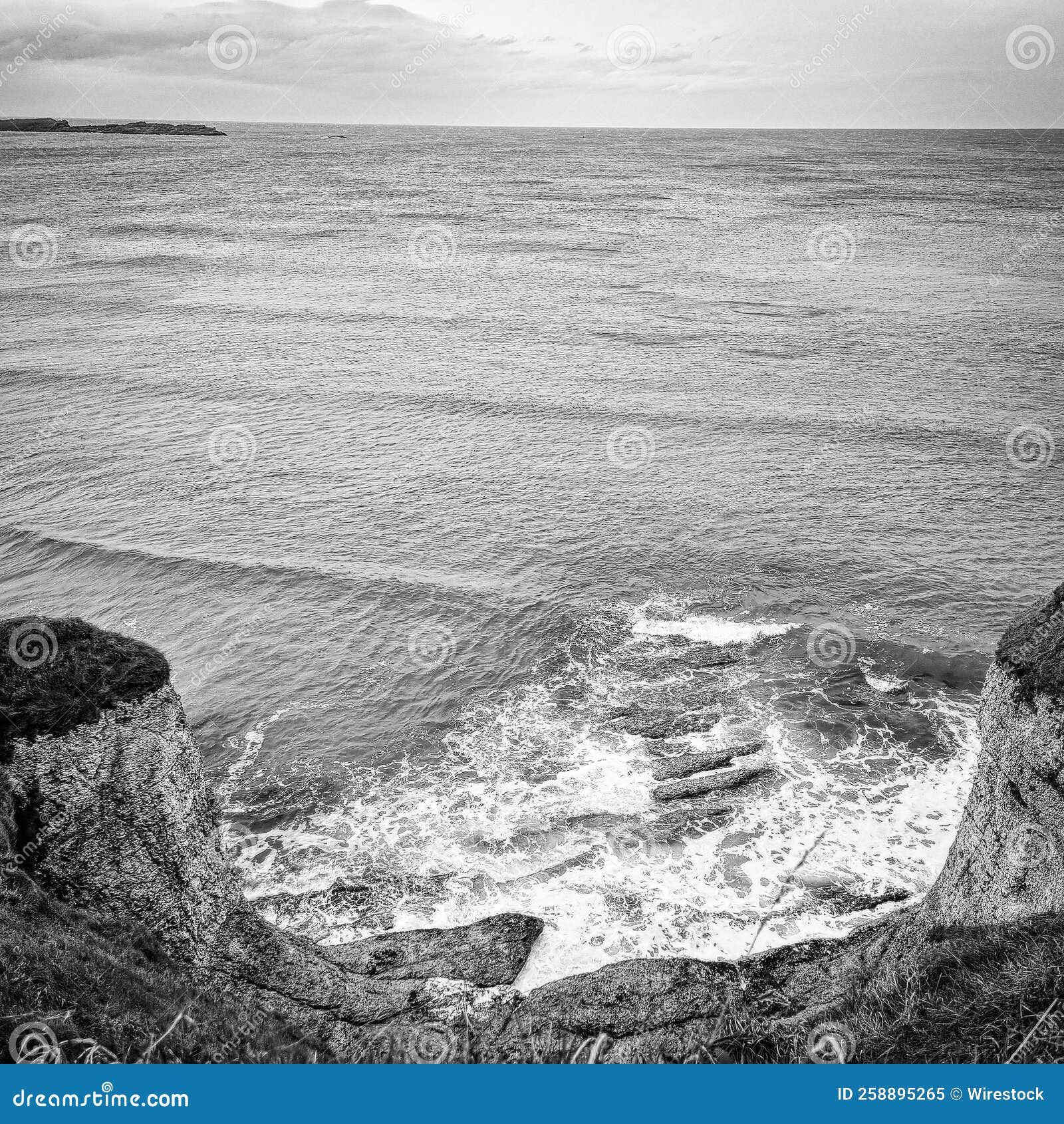 Grayscale Shot of Sea Waves Splashing Against the Shore Stock Image ...