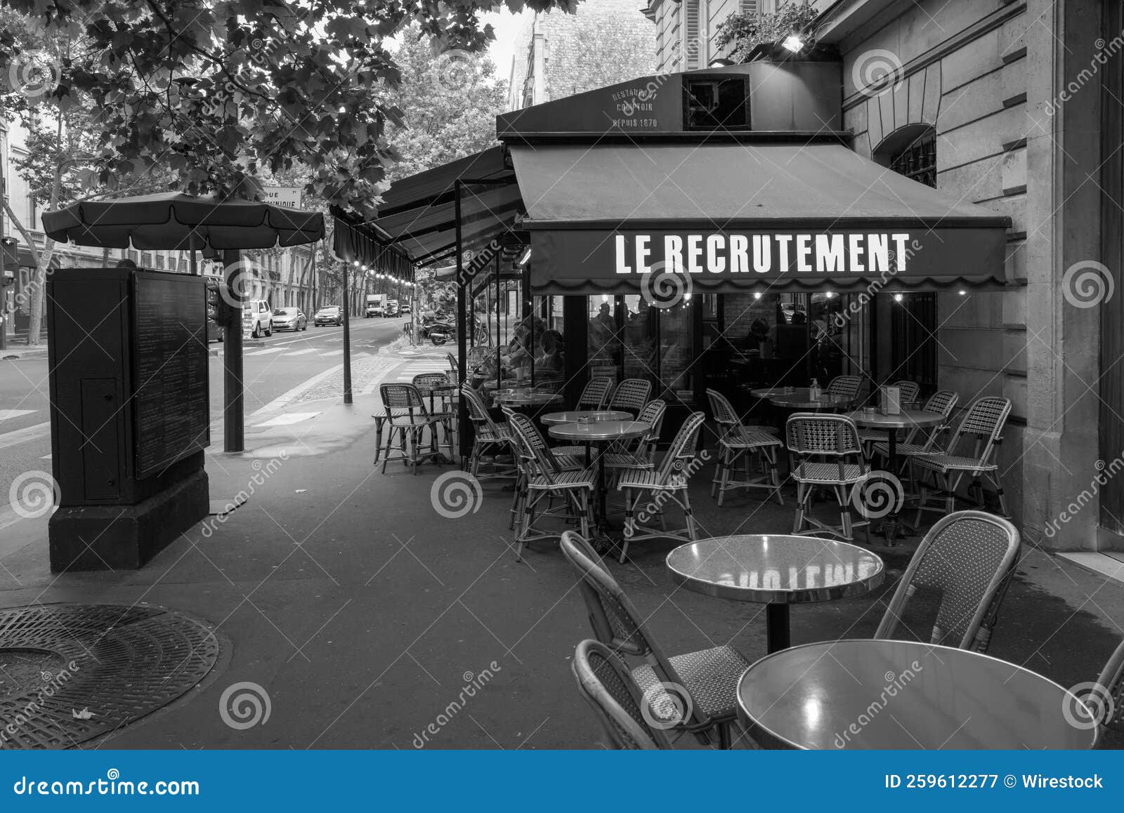 Grayscale Shot of a Sidewalk Cafe in the 7th Arrondissement of Paris ...