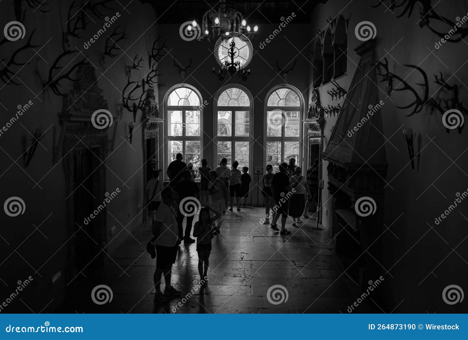 Grayscale Shot of Silhouettes of People Visiting the Ksiaz Castle ...