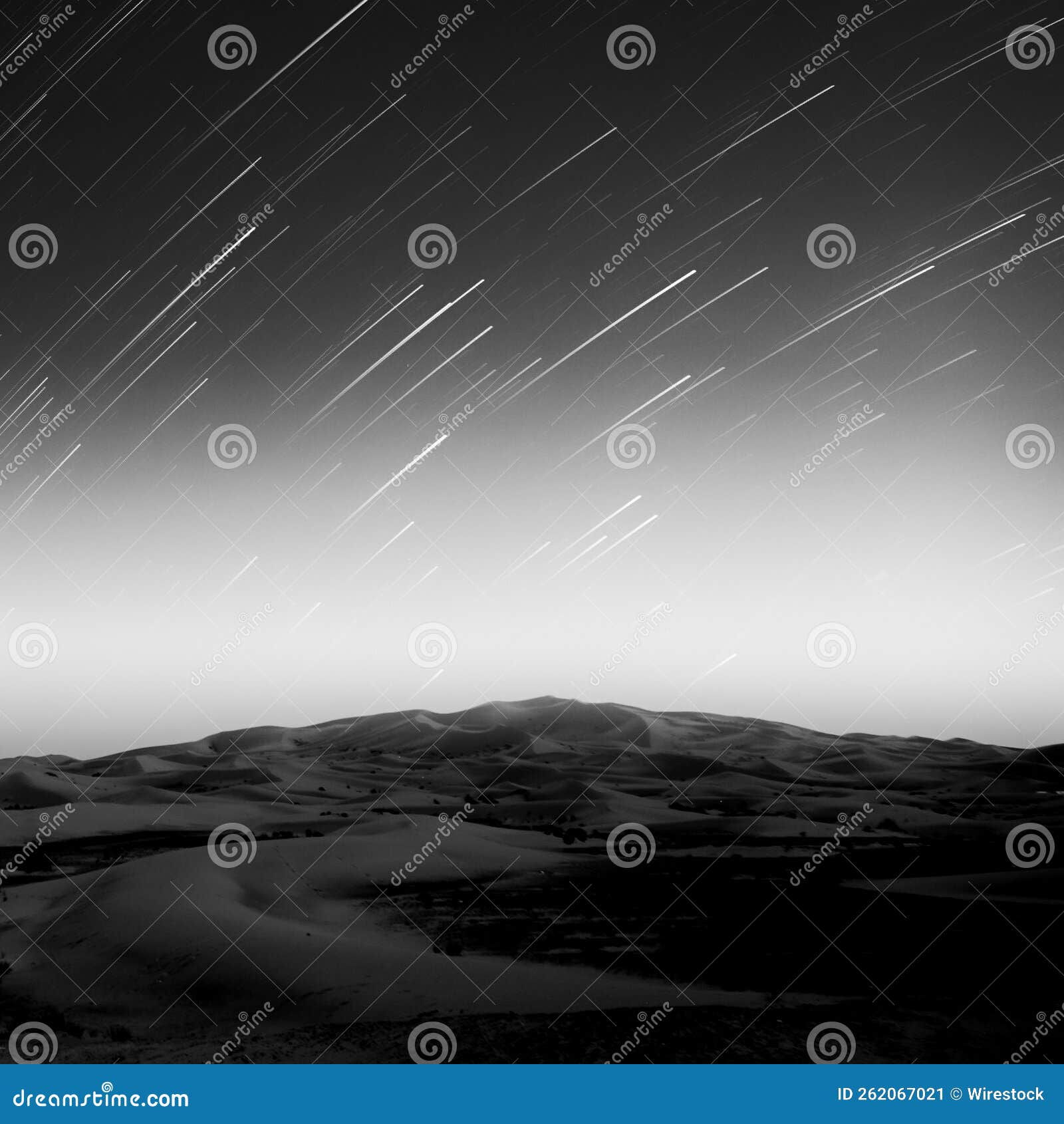 Grayscale of a Star Trail Over the Desert Stock Image - Image of ...