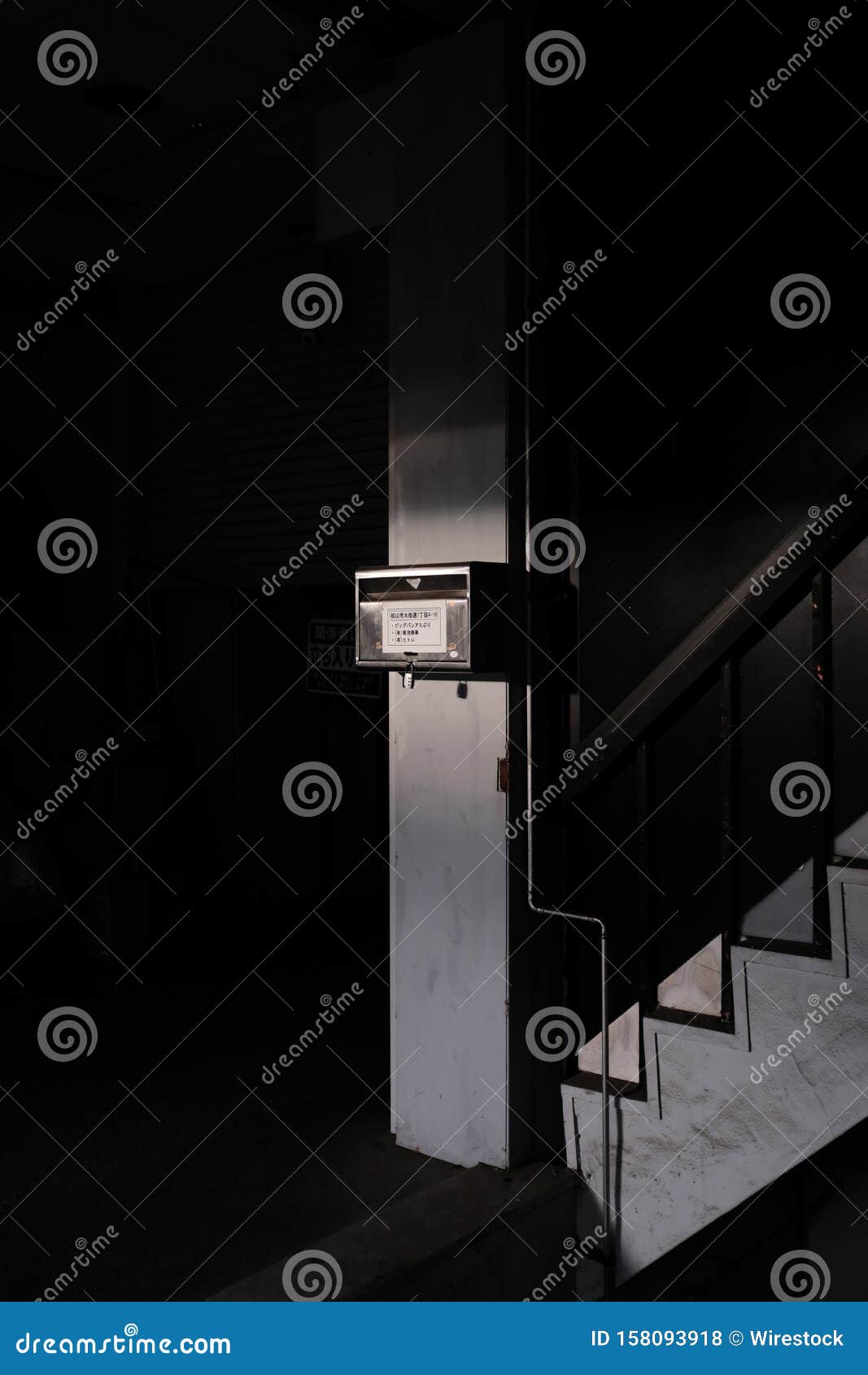Grayscale Vertical Shot of an Emergency Alarm Box on a Wall Stock Photo ...