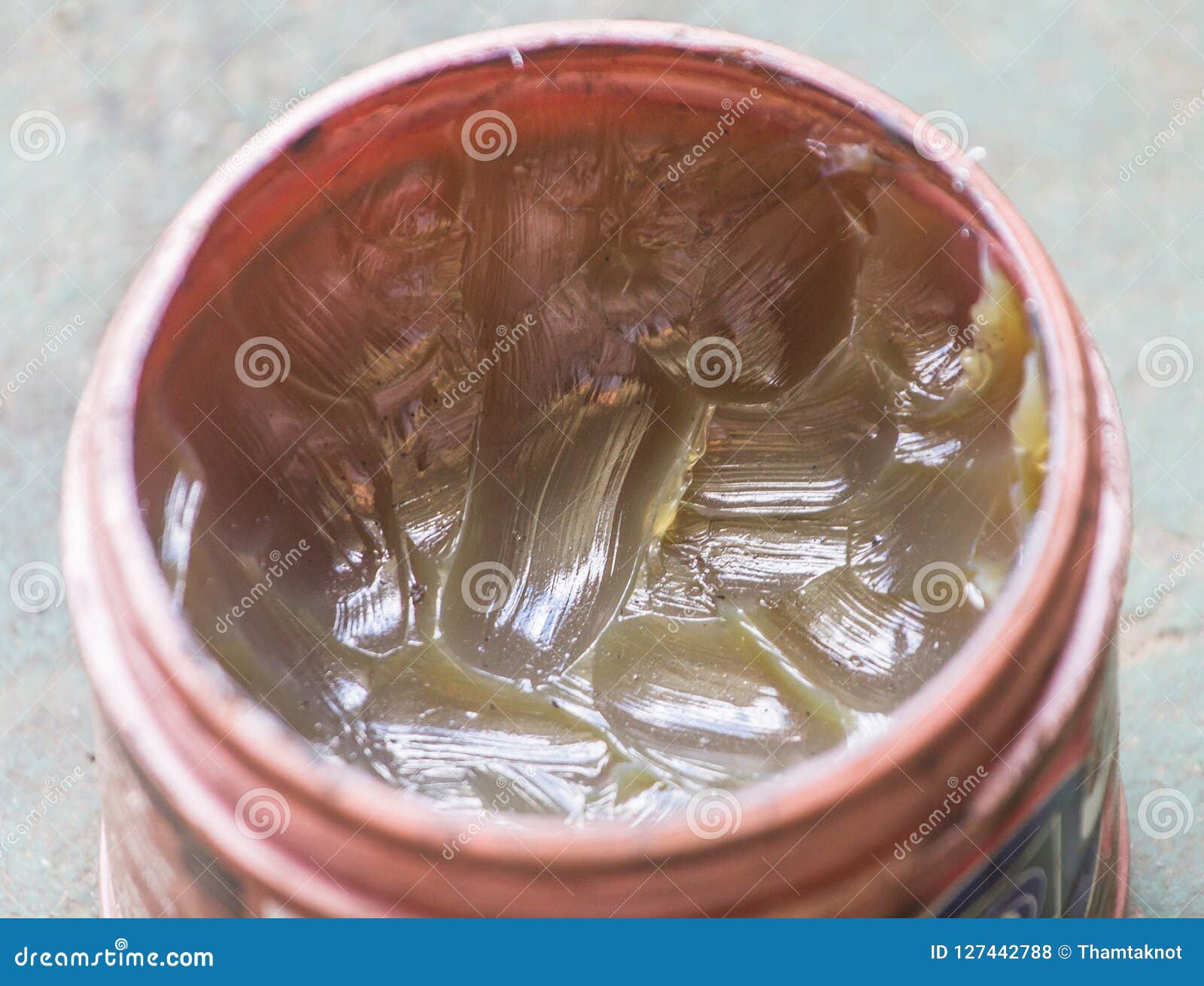 Grease is a Lubricant, Assistant To the Machines. Stock Photo - Image ...