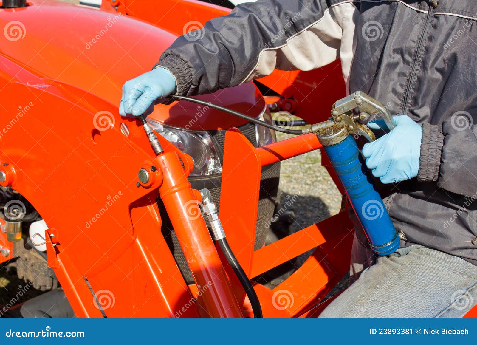 Greasing Tractor Piston stock image. Image of detail - 23893381