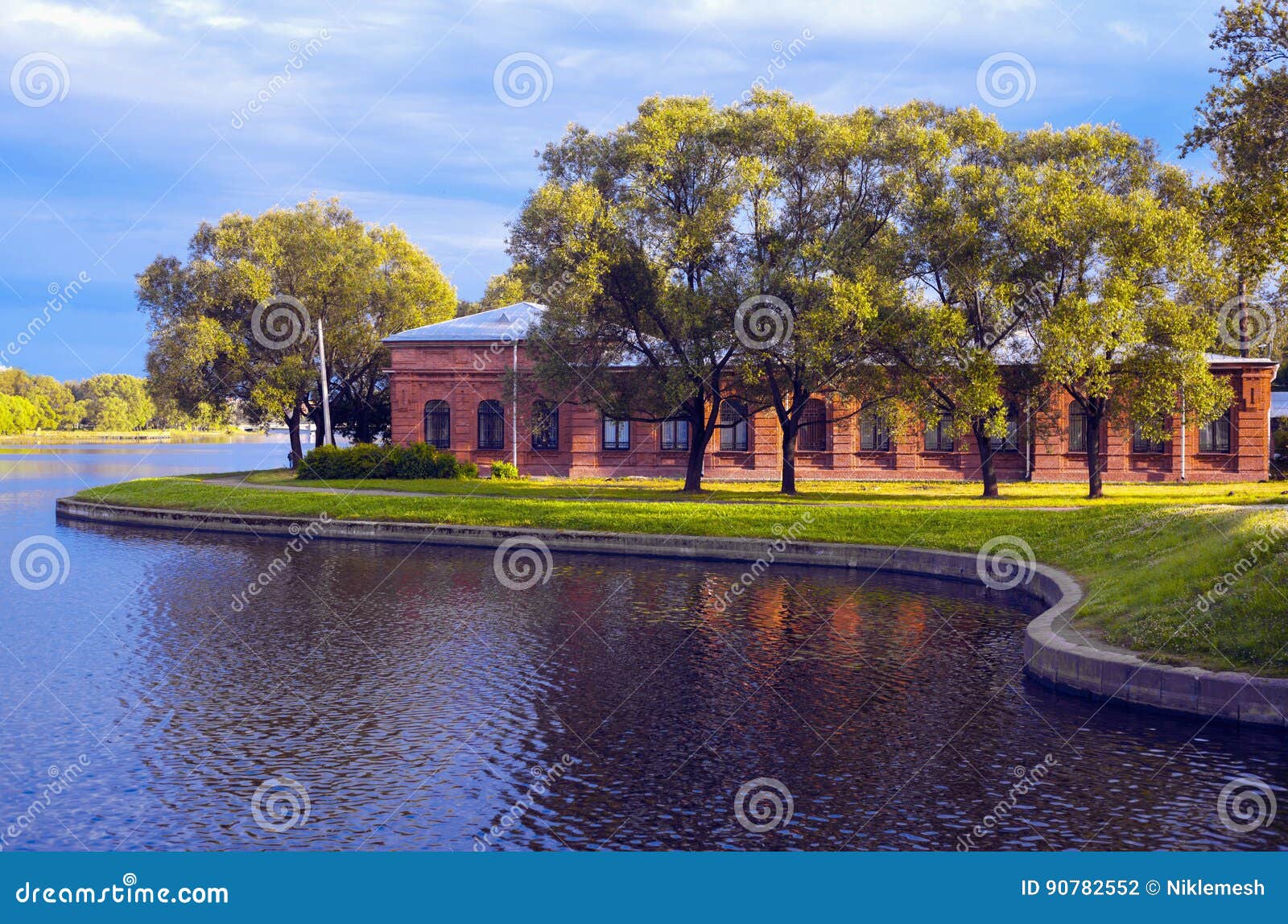 Great Ancient Brick Building on the Lake Shore Stock Photo - Image of ...