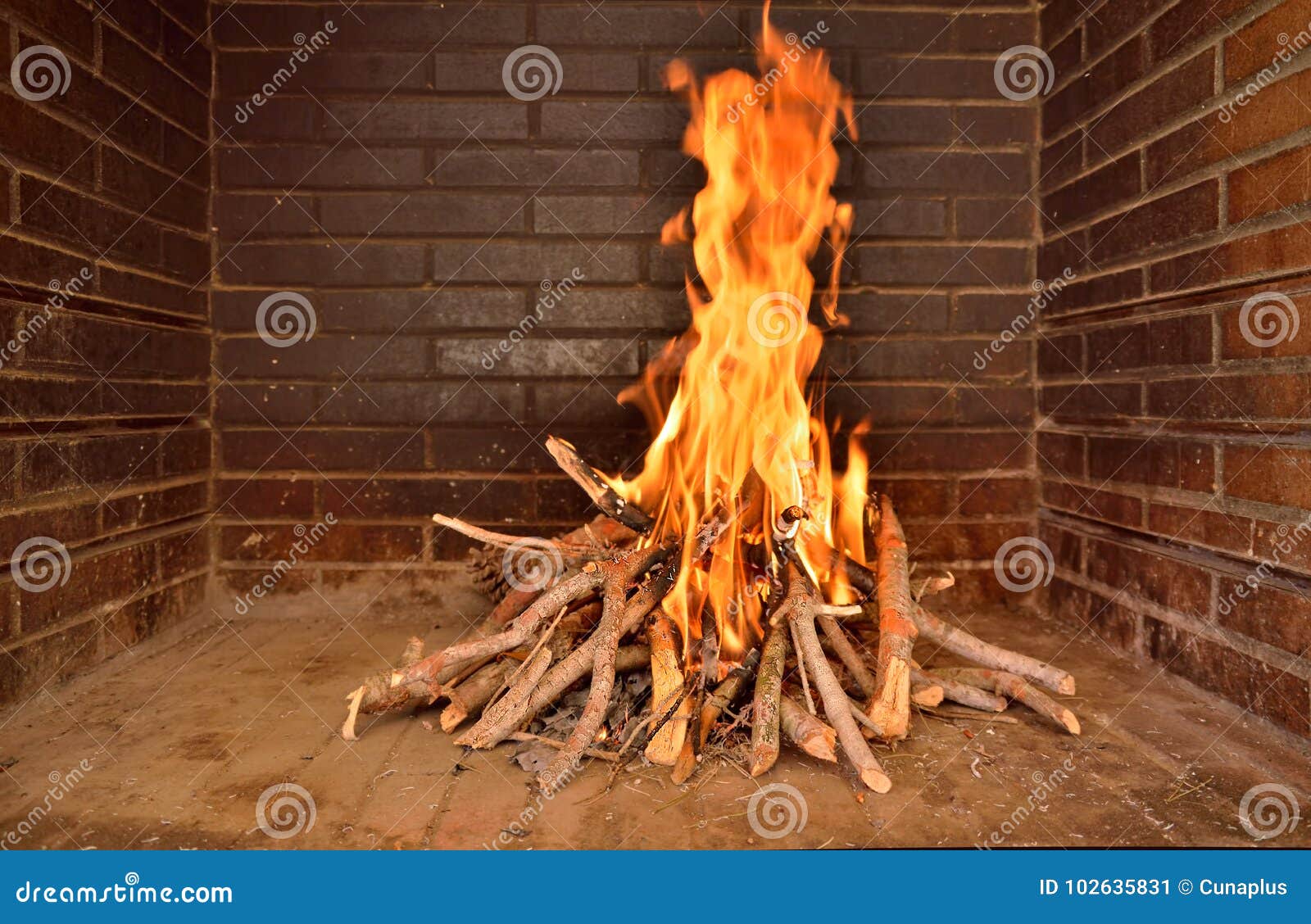Fire burns in a chimney stock image. Image of black - 102635831