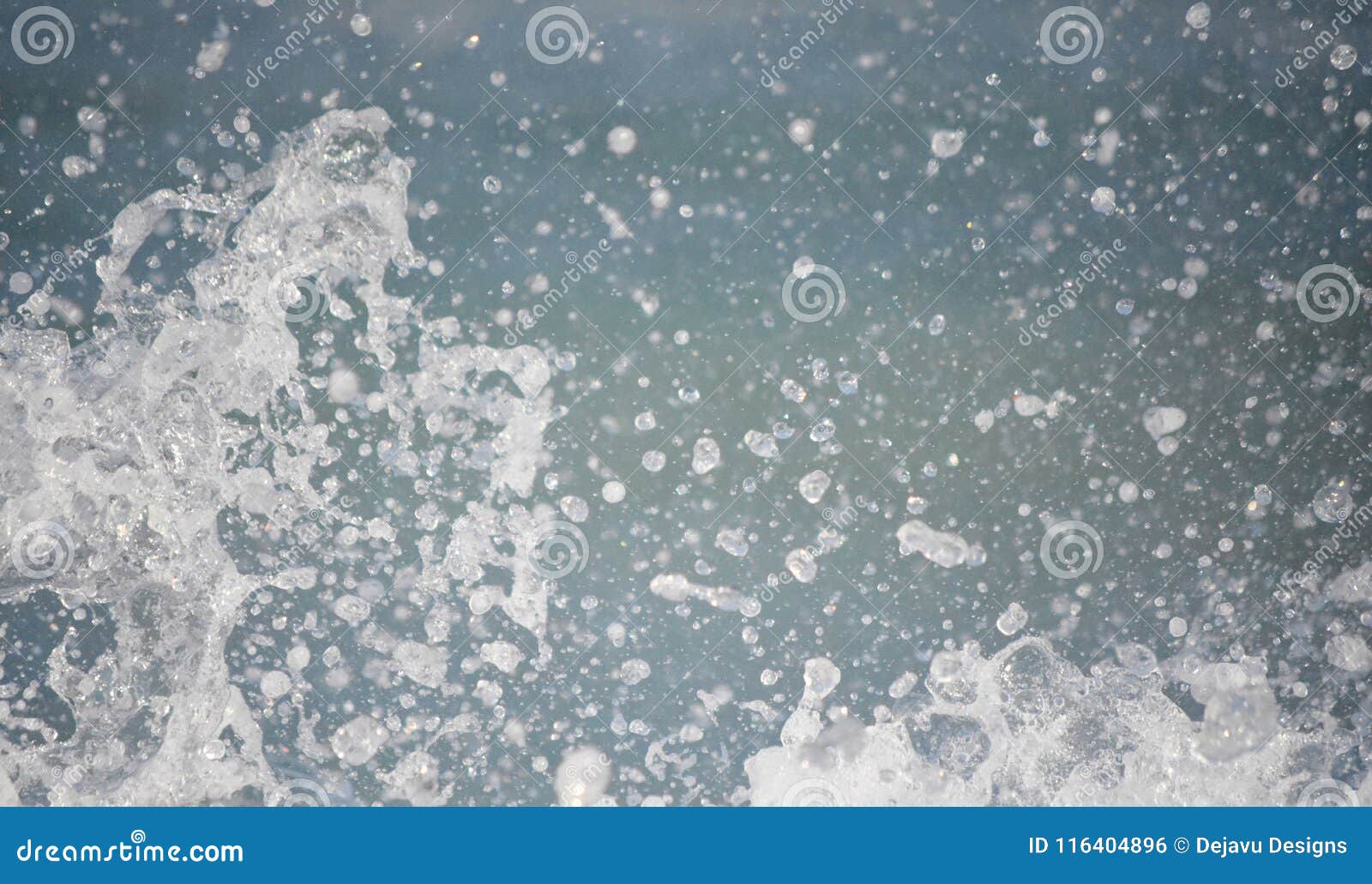 Great Capture of Water Drops Spraying into the Air Stock Photo - Image ...