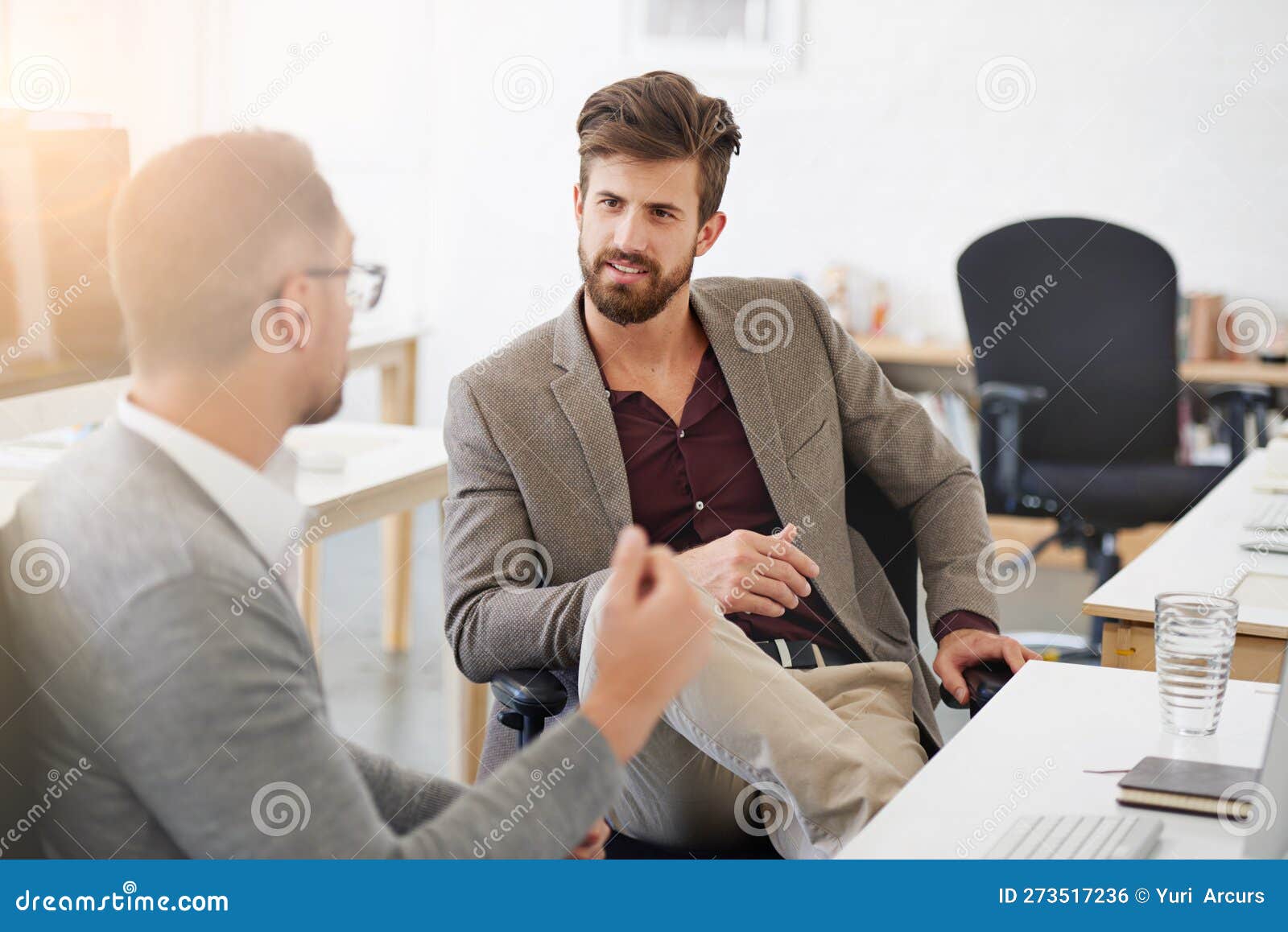 Great Communication is Key in the Workplace. Two Businessmen Having a ...