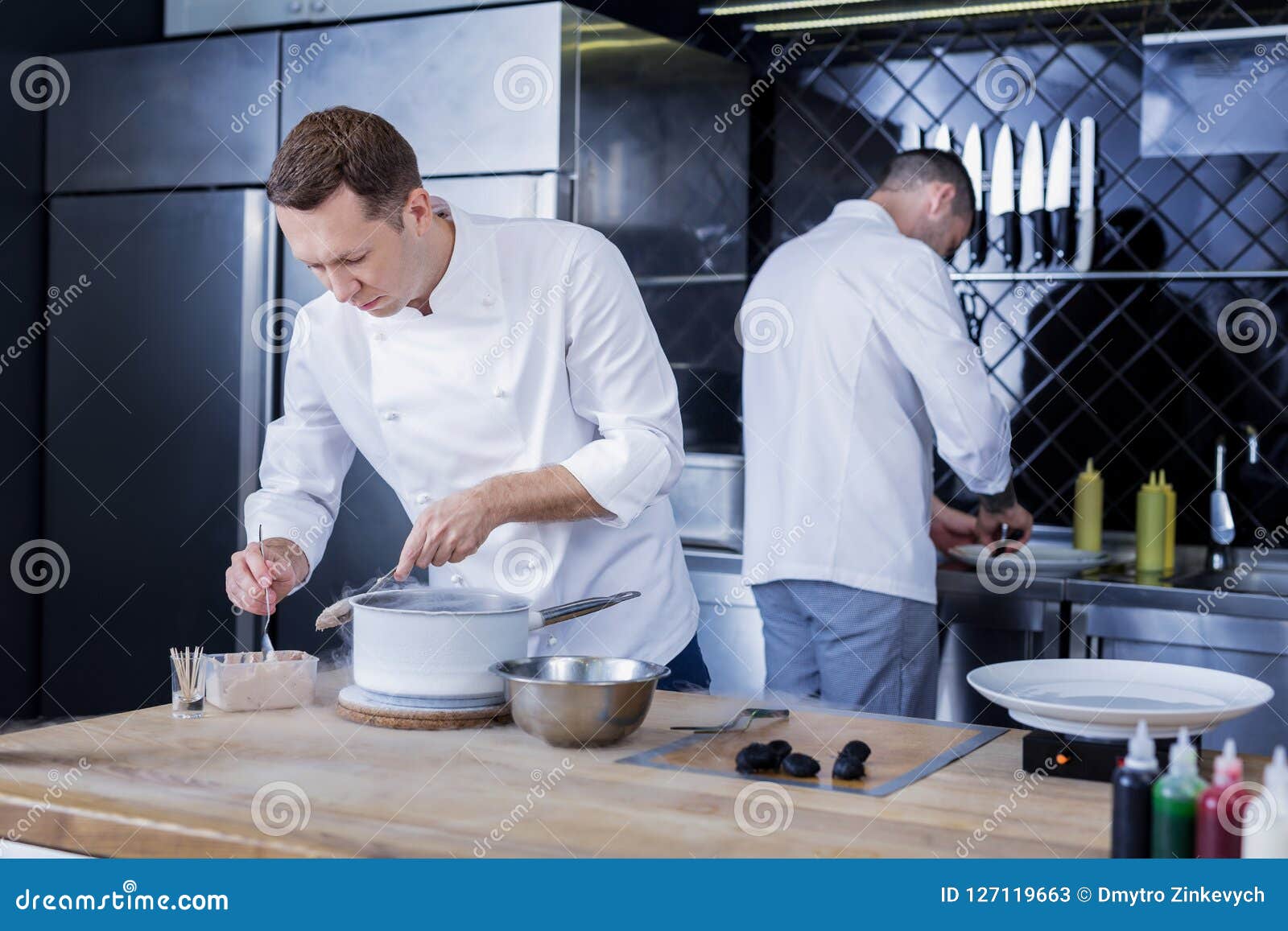 Great Cooks Working in the Kitchen Together Stock Image - Image of ...