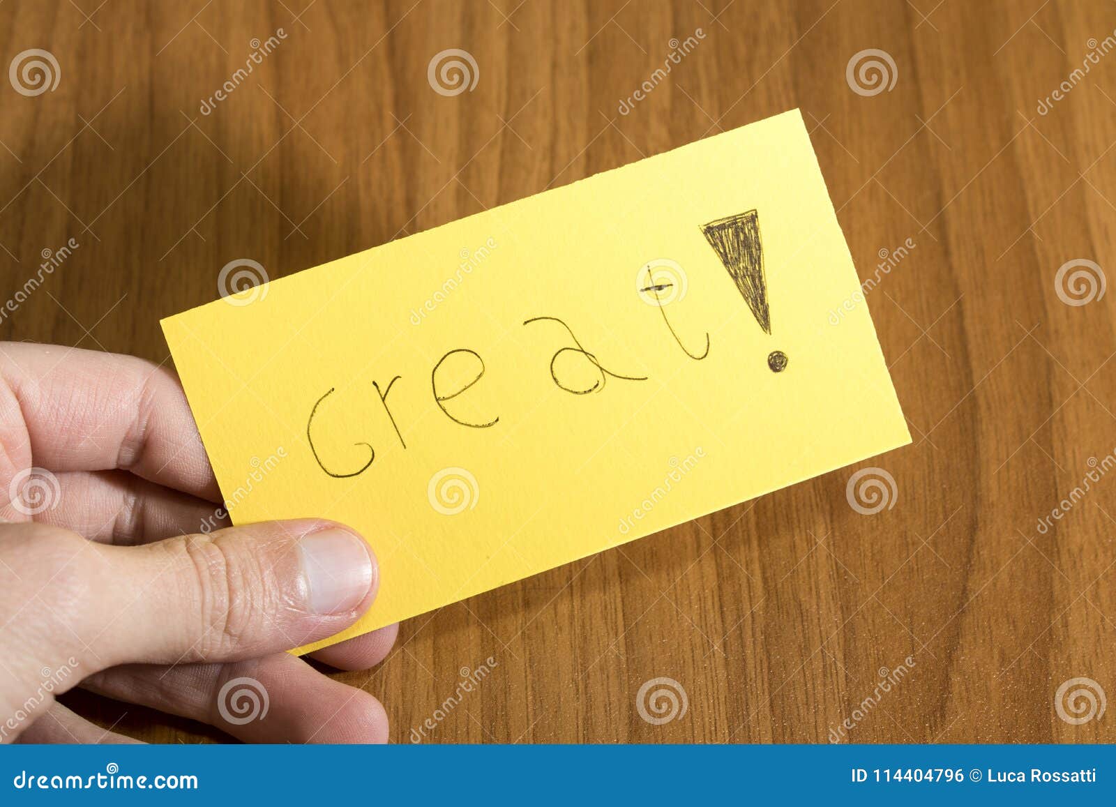 Great Handwrite on a Yellow Paper with a Pen on a Table Stock Photo ...