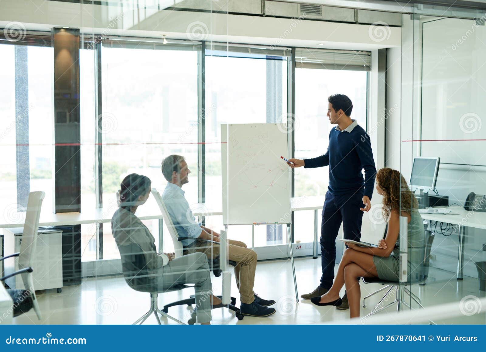 Great Ideas in the Making. a Group of Colleagues Brainstorming in an ...