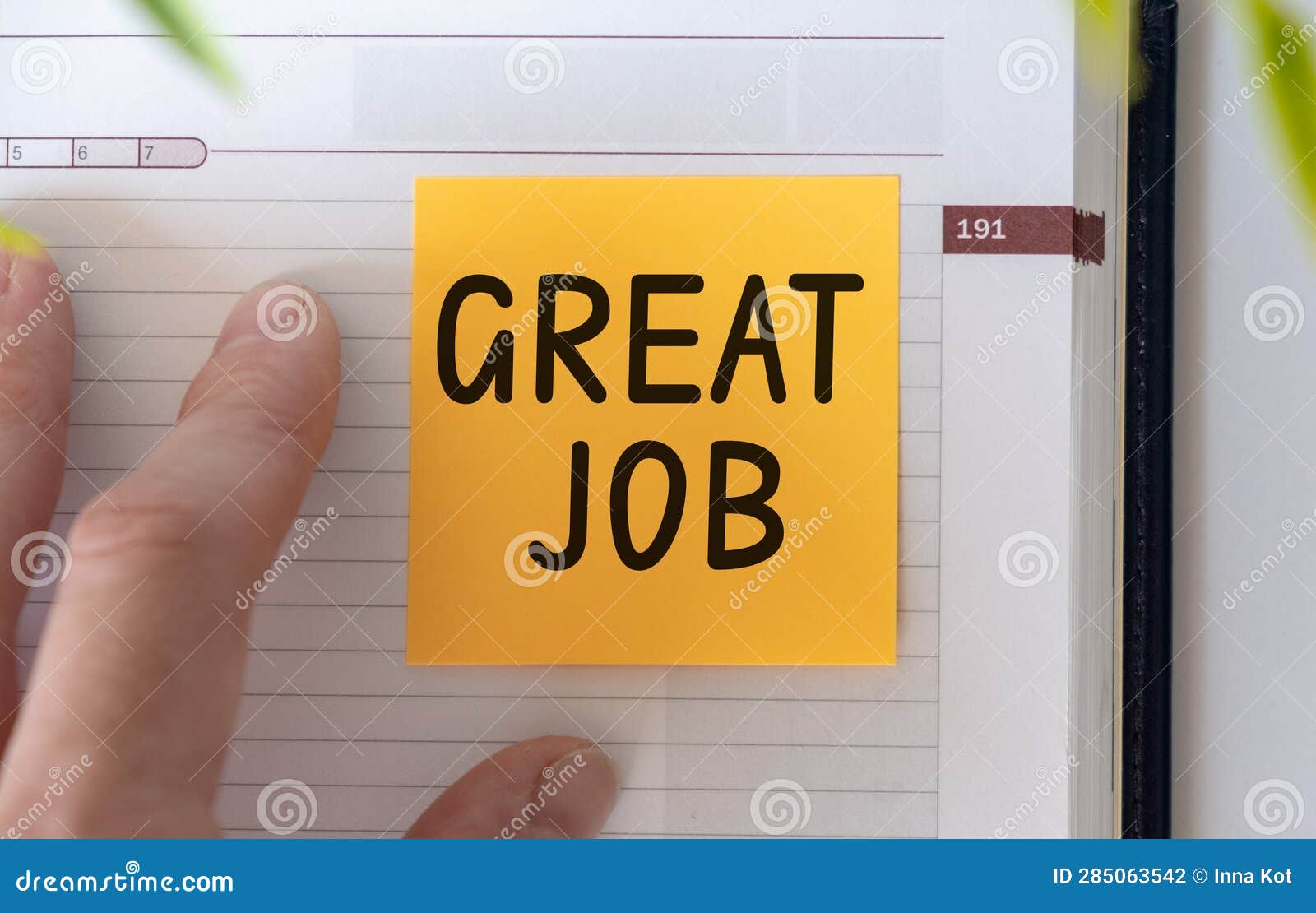 GREAT JOB Text on a Notebook with Hand on White Background Stock Photo ...